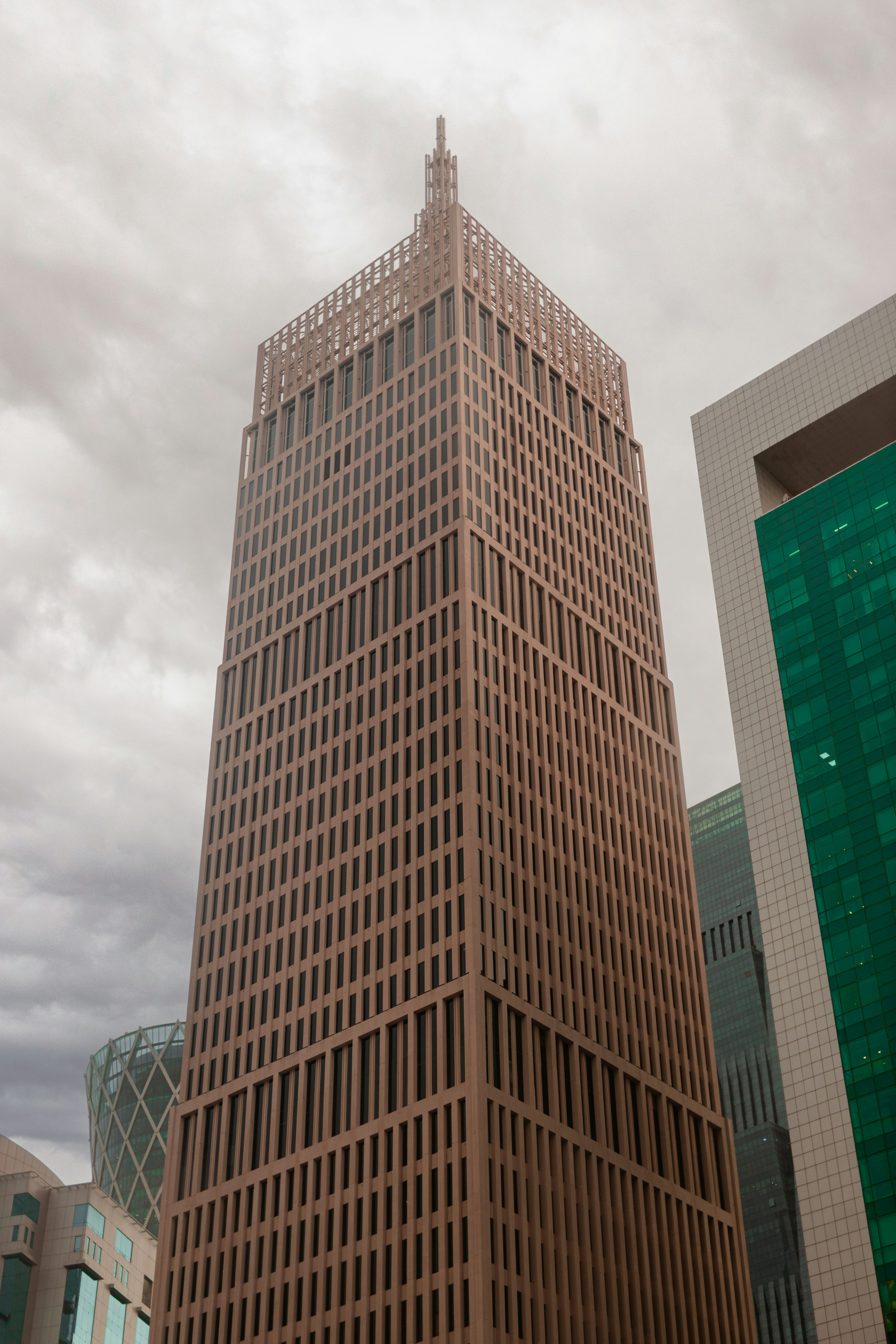 A tall building with a sky background photo – Free Al dafna Image on ...
