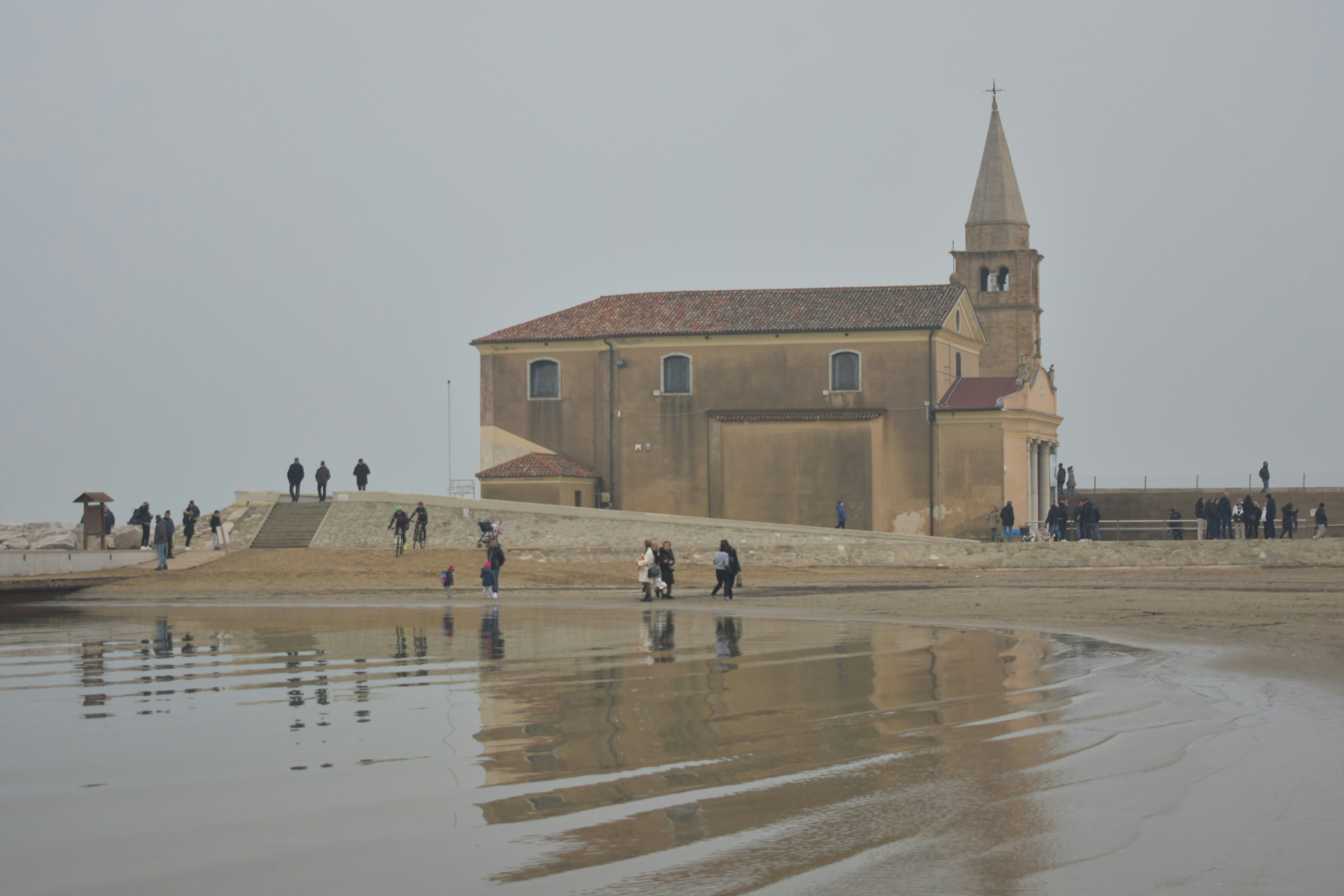 Harbor Church at Low Tide: Reflections on a Quiet Promenade