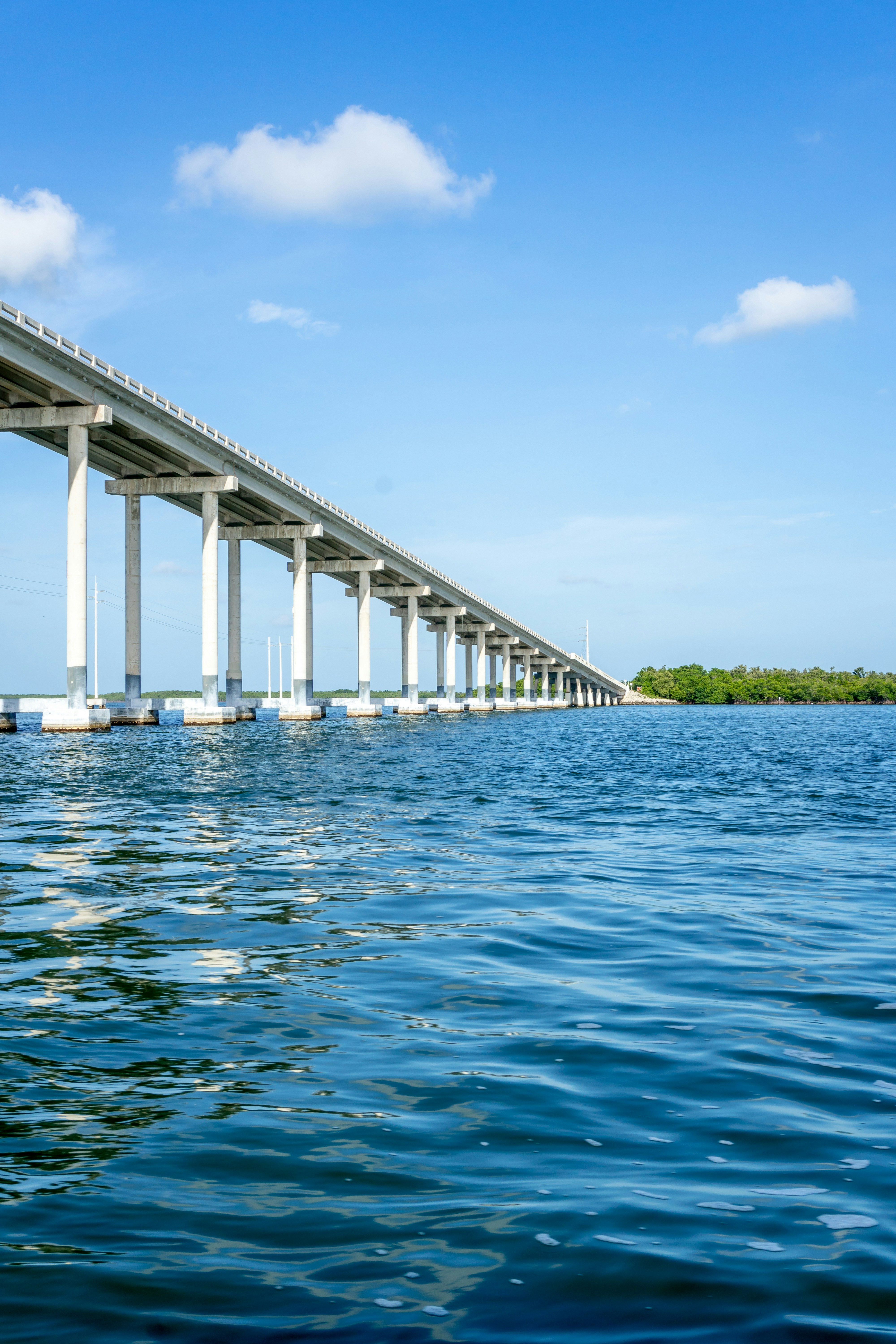 A long bridge over a large body of water photo – Free Card sound road ...