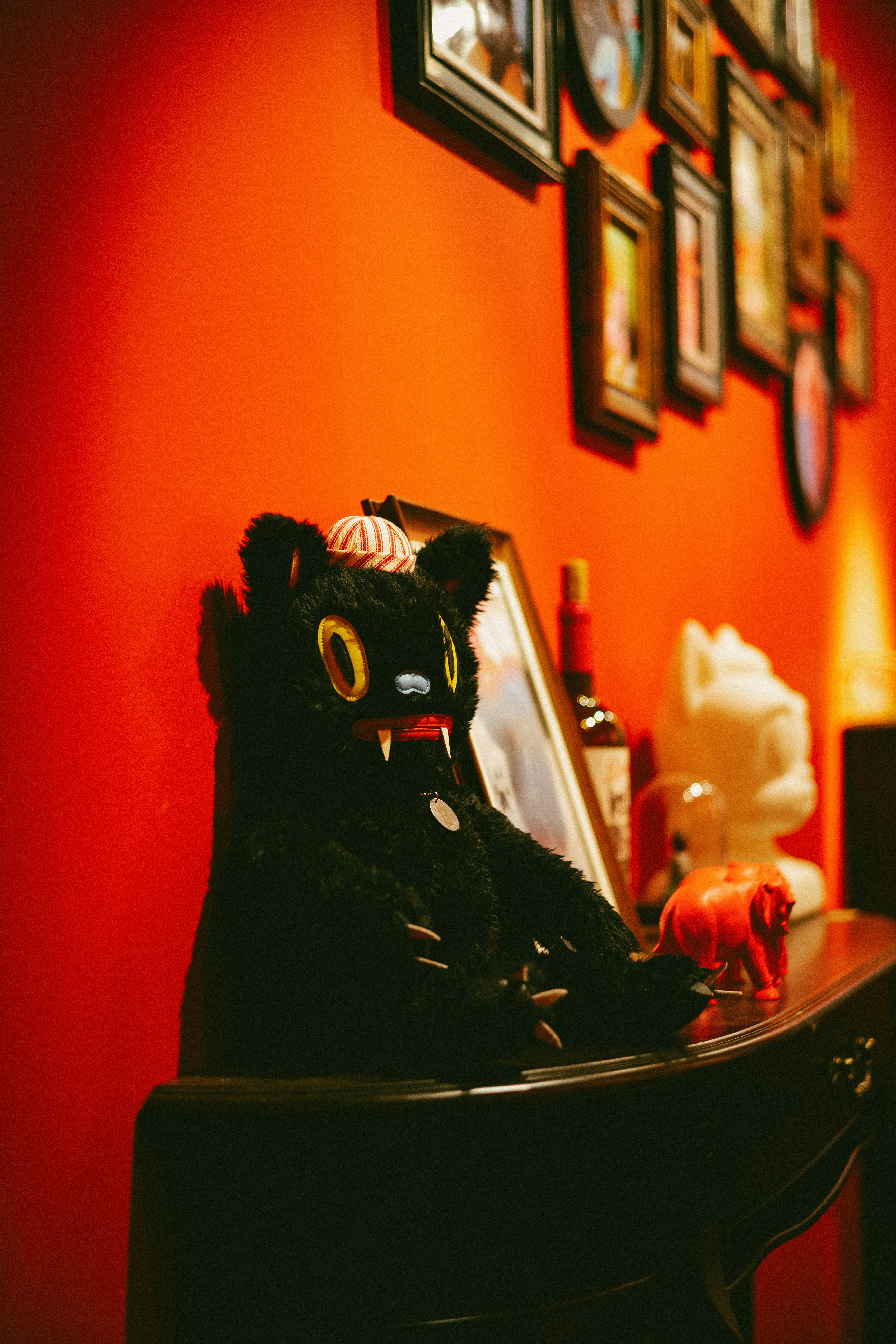 Velvet Cat on a Warm Amber Console: A Quiet Still Life