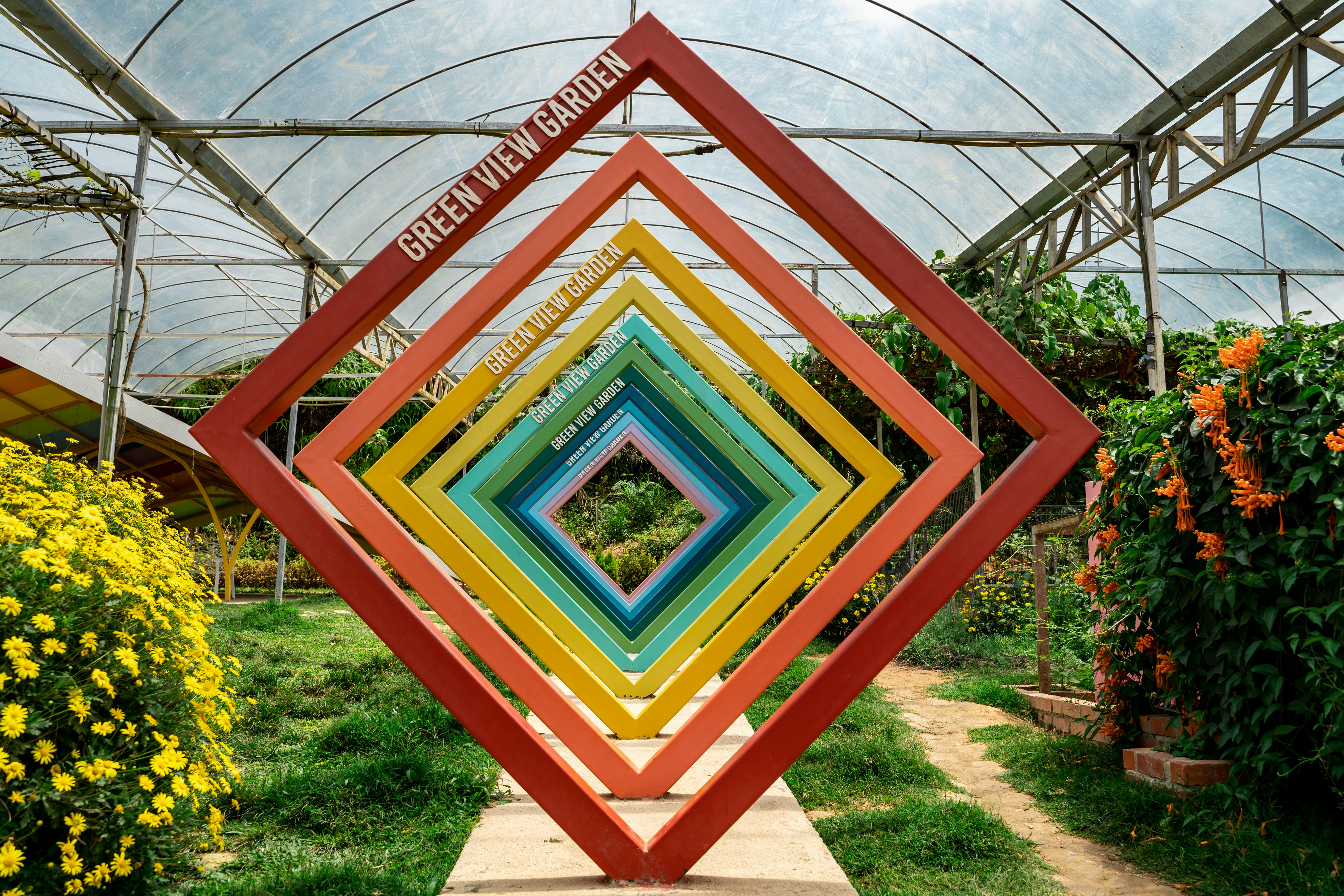 Rainbow Diamond Gate: A Kaleidoscopic Rainbow Tunnel in a Glasshouse