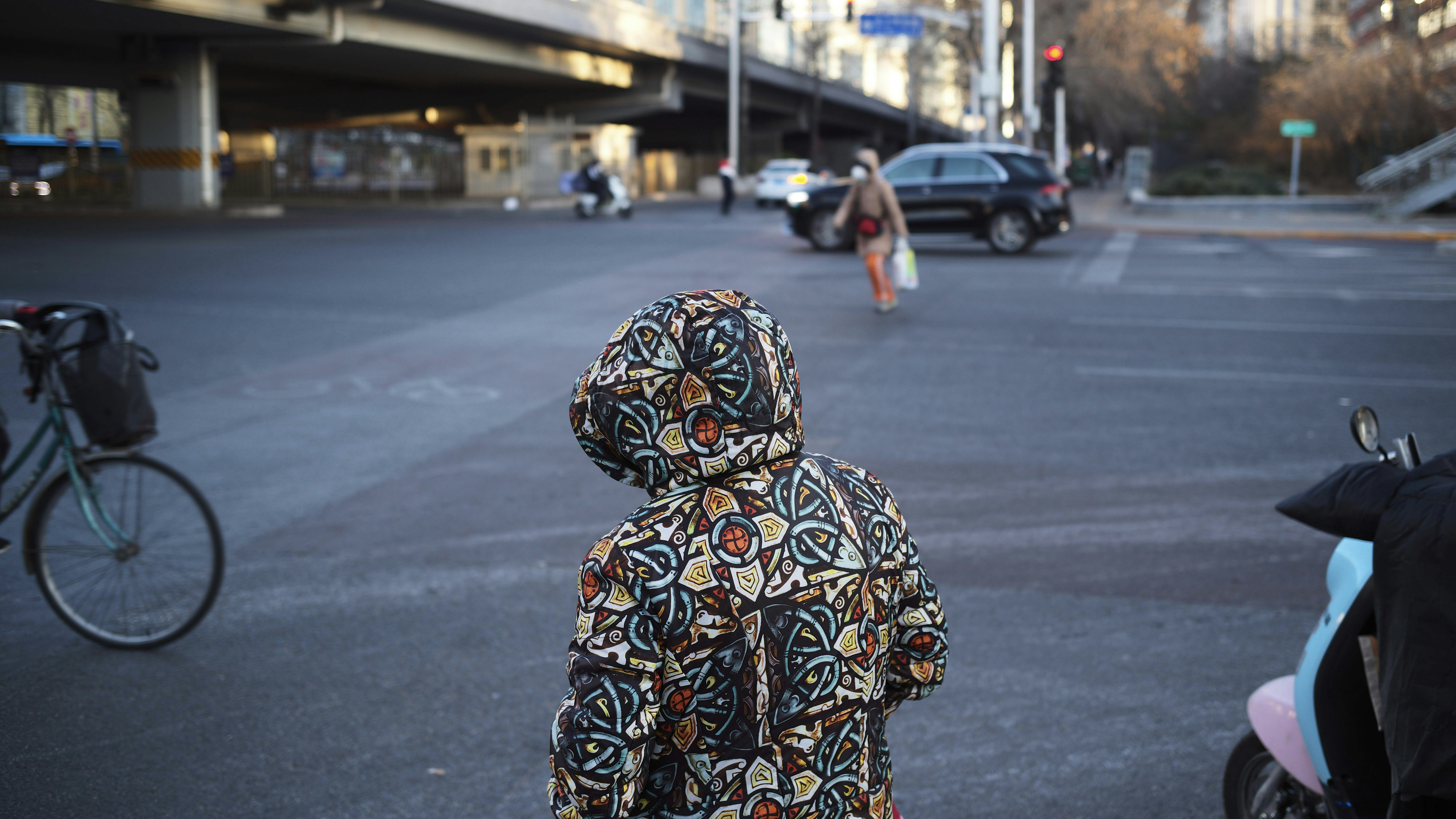 Crosswalk Couture: Patterned Hood at the Intersection