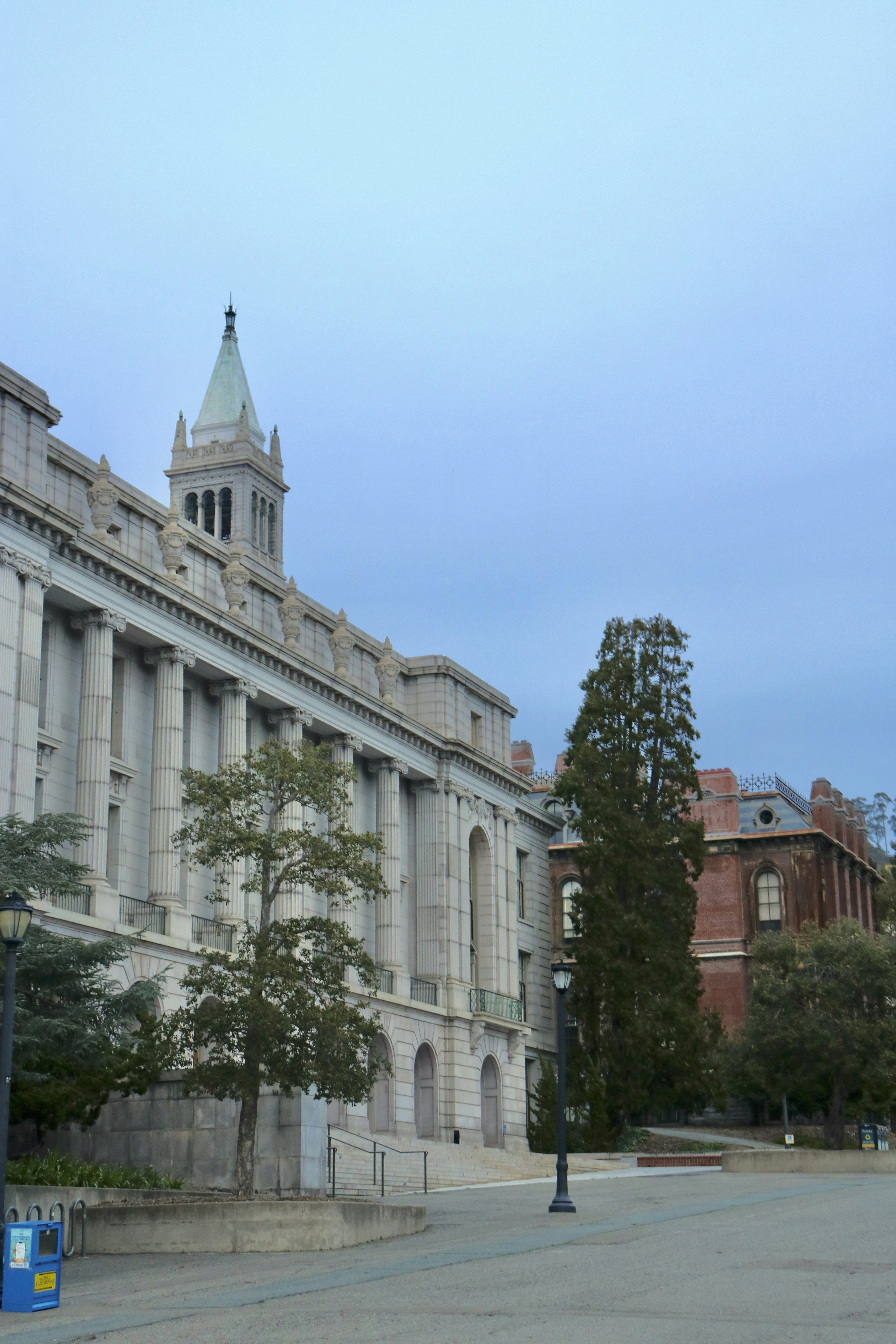 A large building with a clock tower on top of it photo – Free Berkeley ...