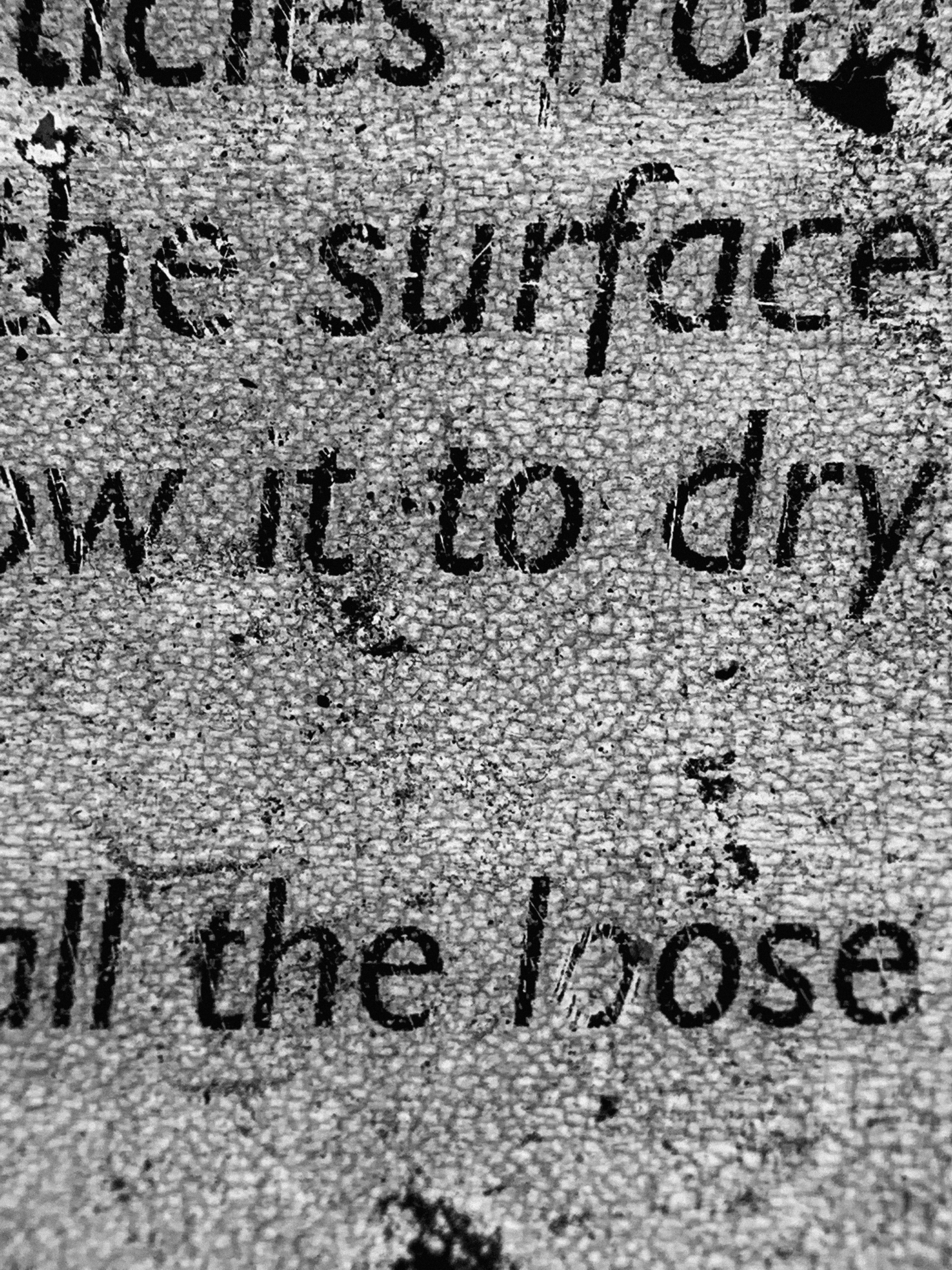 Granulated Textscape: Weathered Typography on Rough Surface
