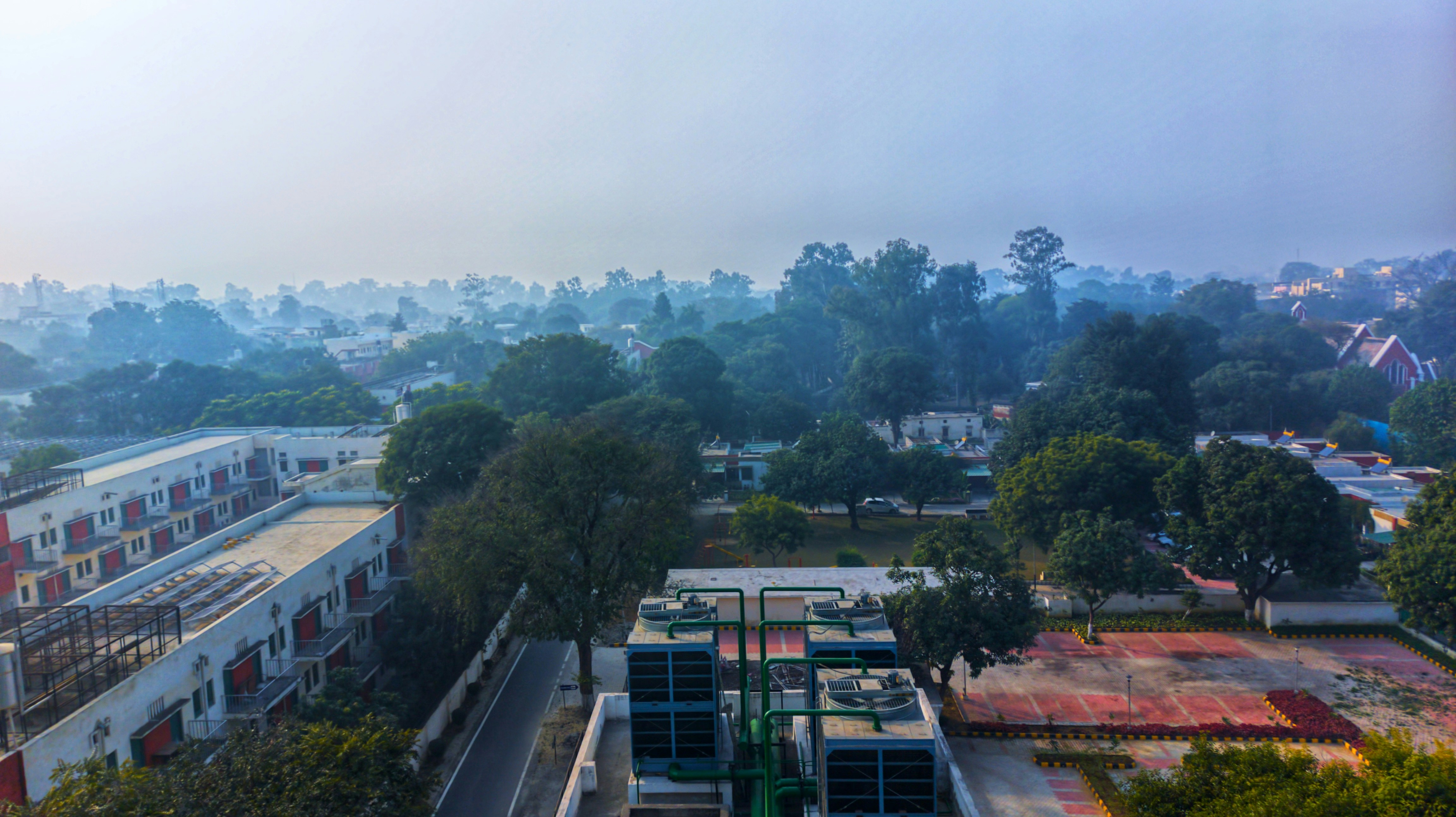 A city with a lot of trees and buildings photo – Free Indian institute ...