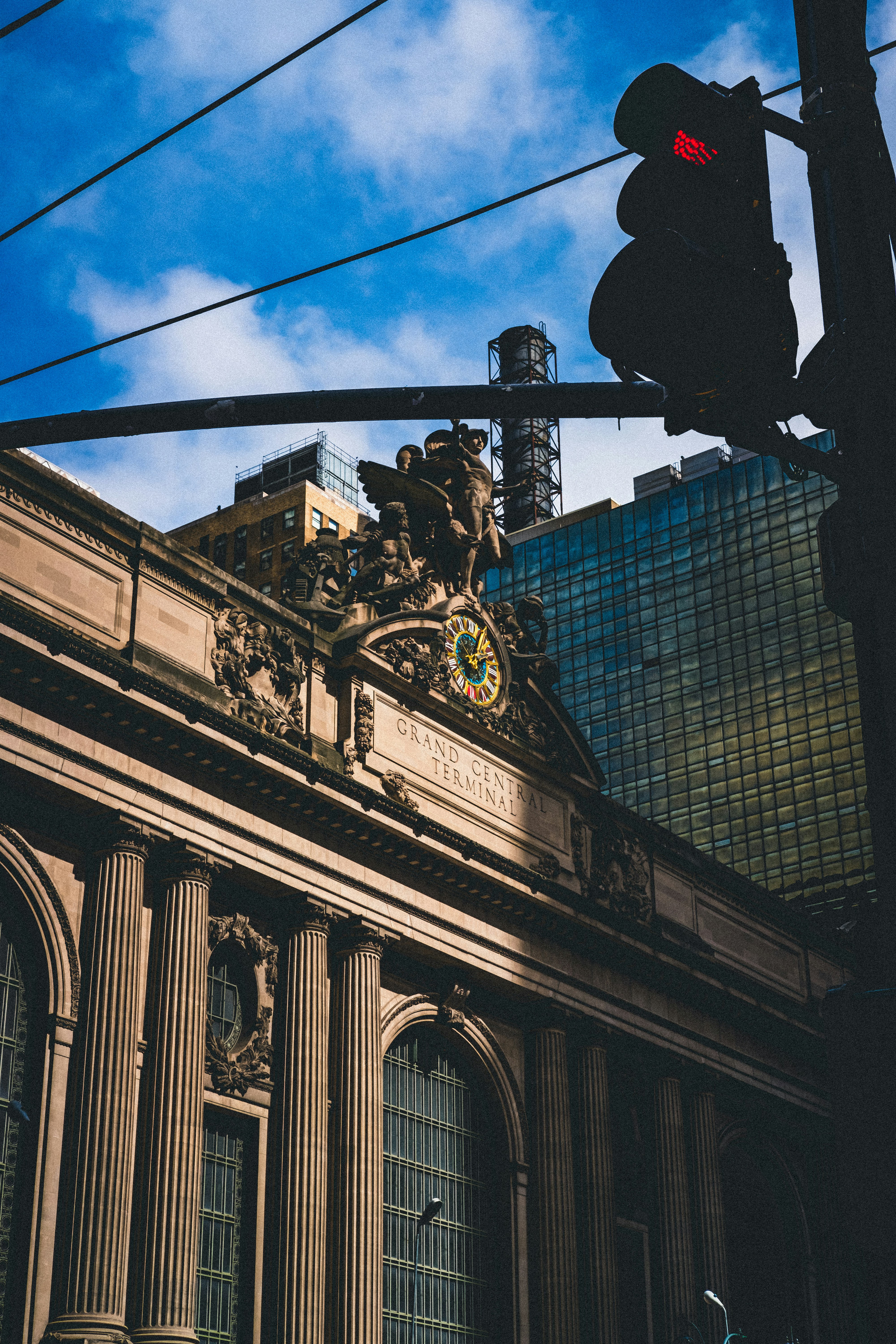 Timekeeper's Crest: Grand Central's Clock Tower Framed by Steel and Sky