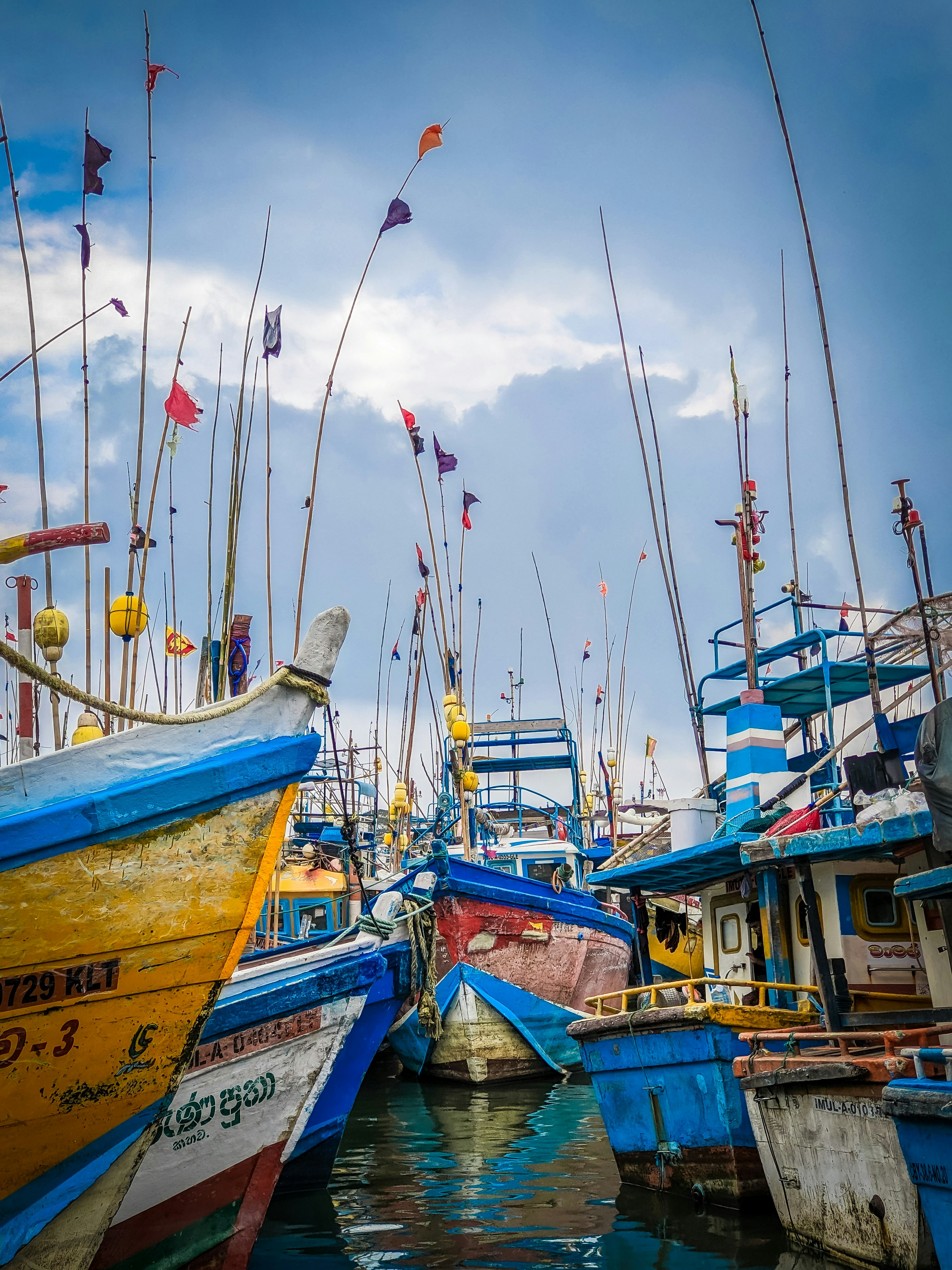 a bunch of boats that are sitting in the water