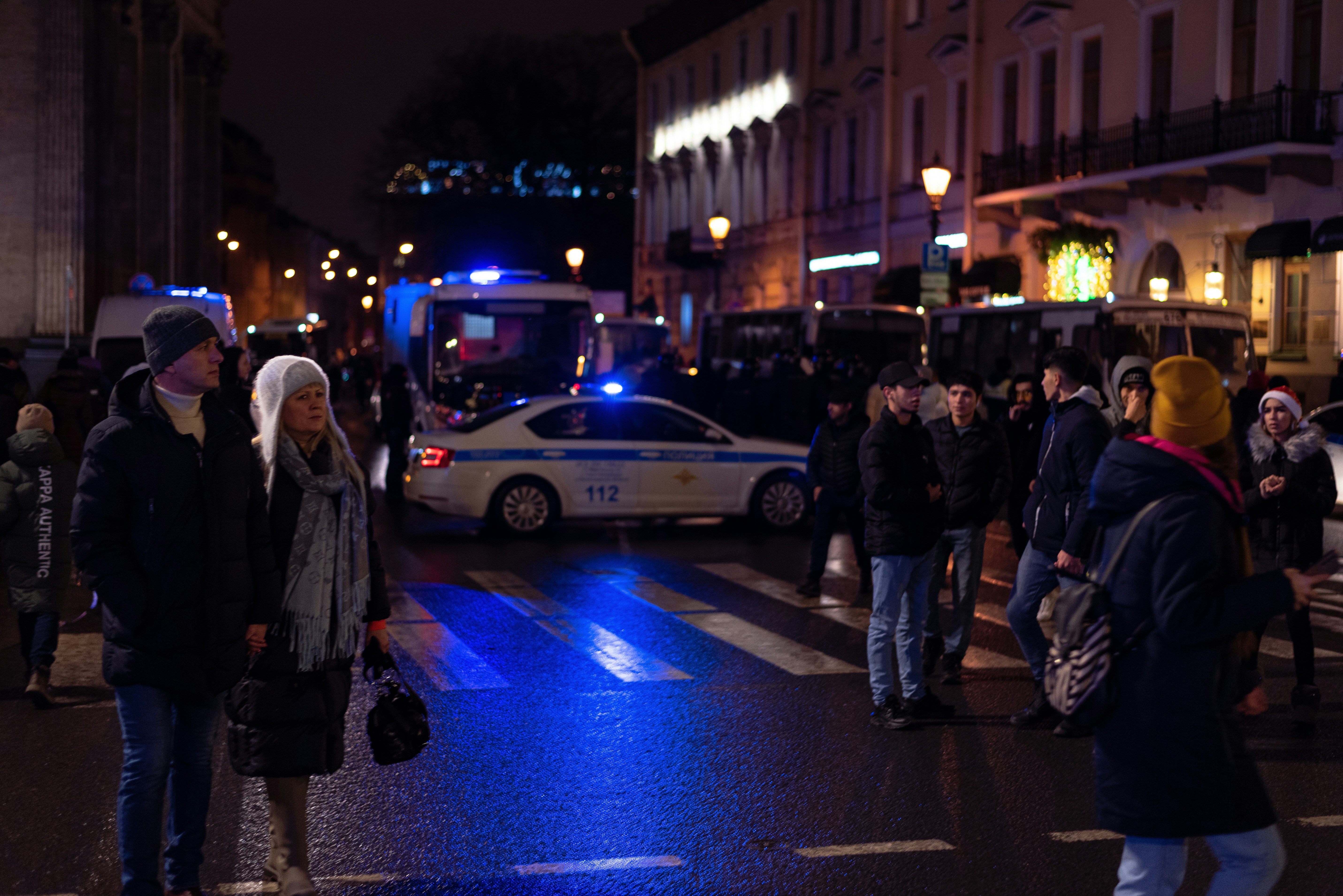 Midnight Crosswalk: Blue Lights Over a Quiet City Street
