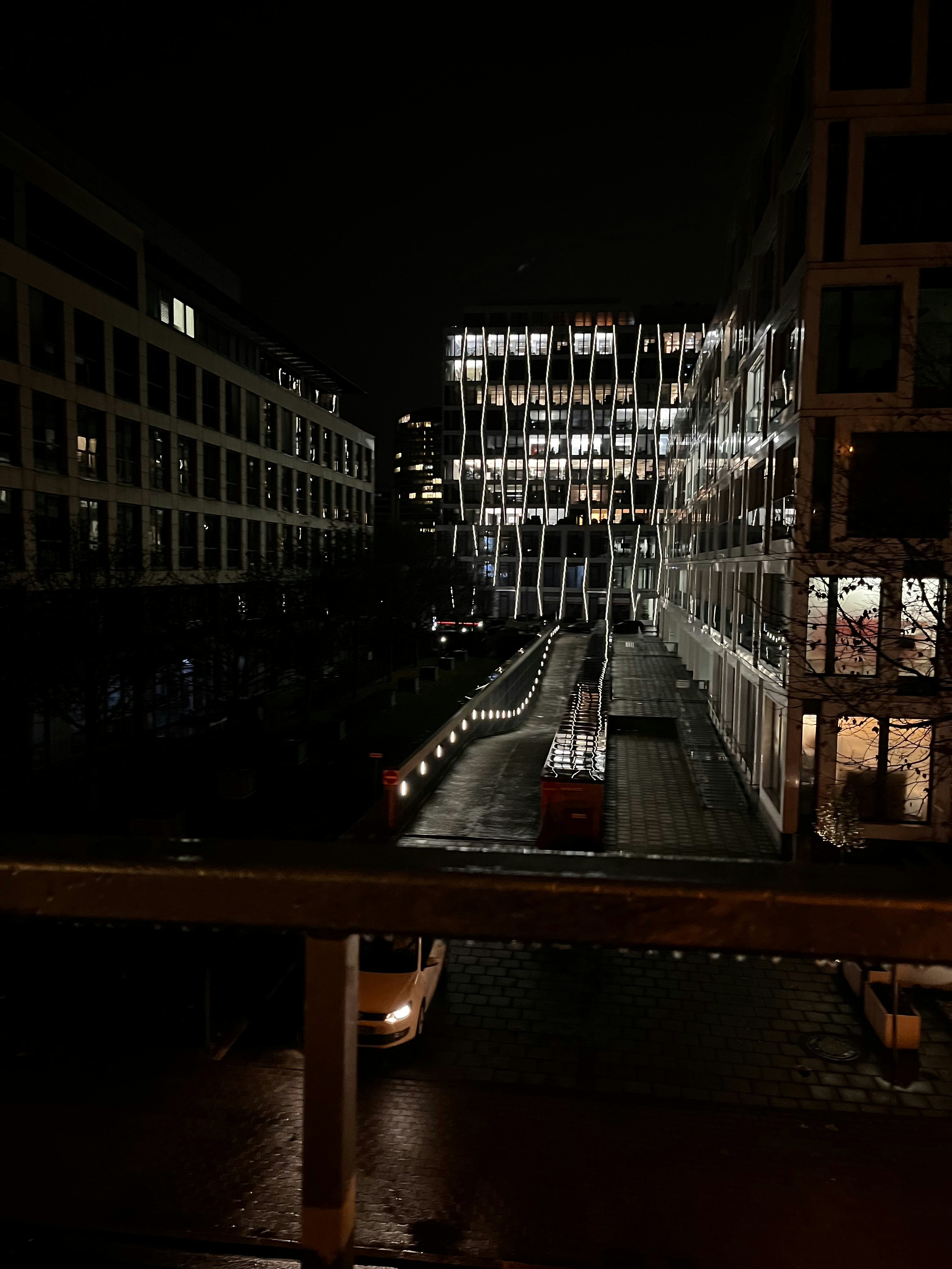 Neon Veins Across a Quiet Night Courtyard