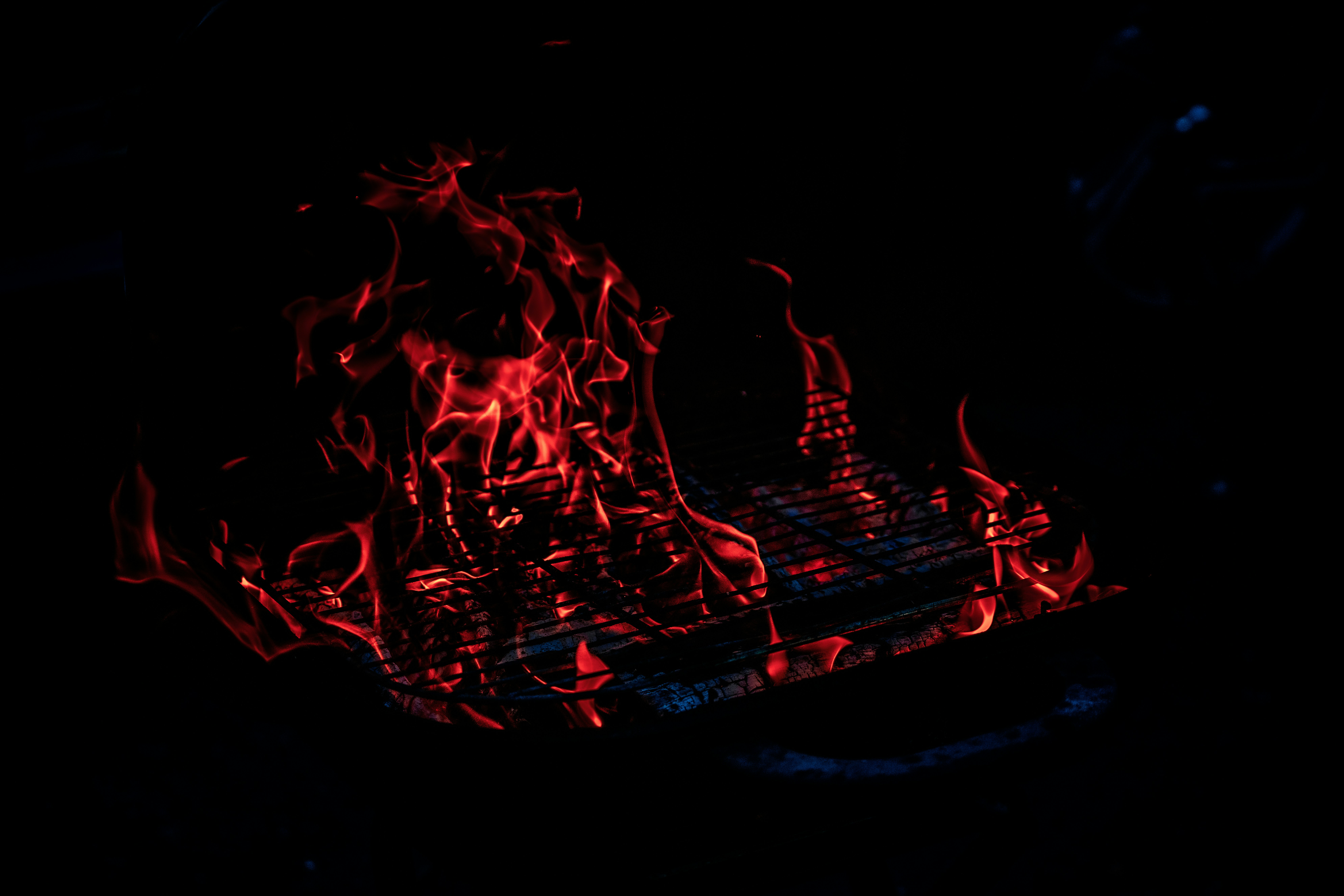 Crimson Ember on a Dark Grill
