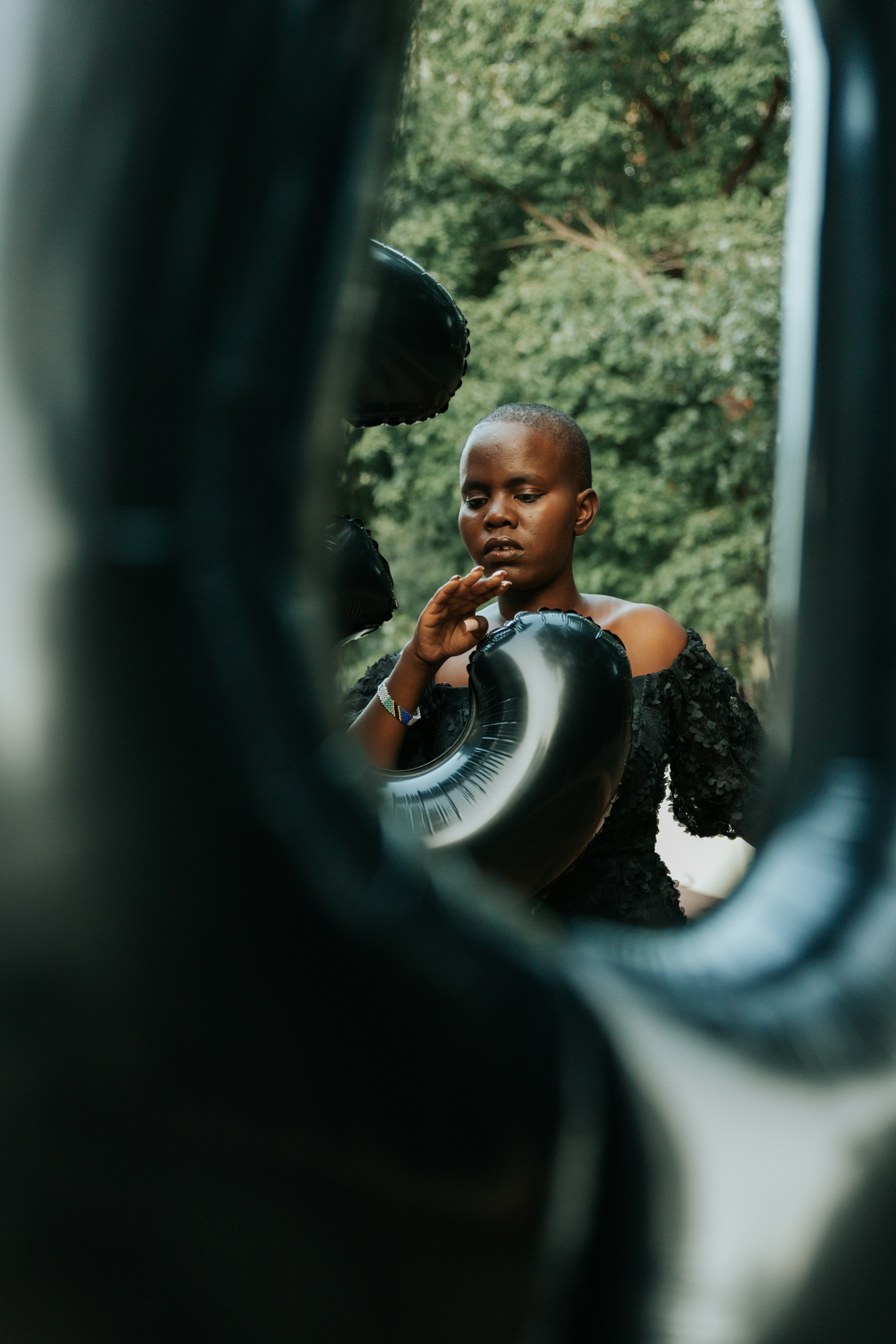 Focused gaze through a festival of balloons