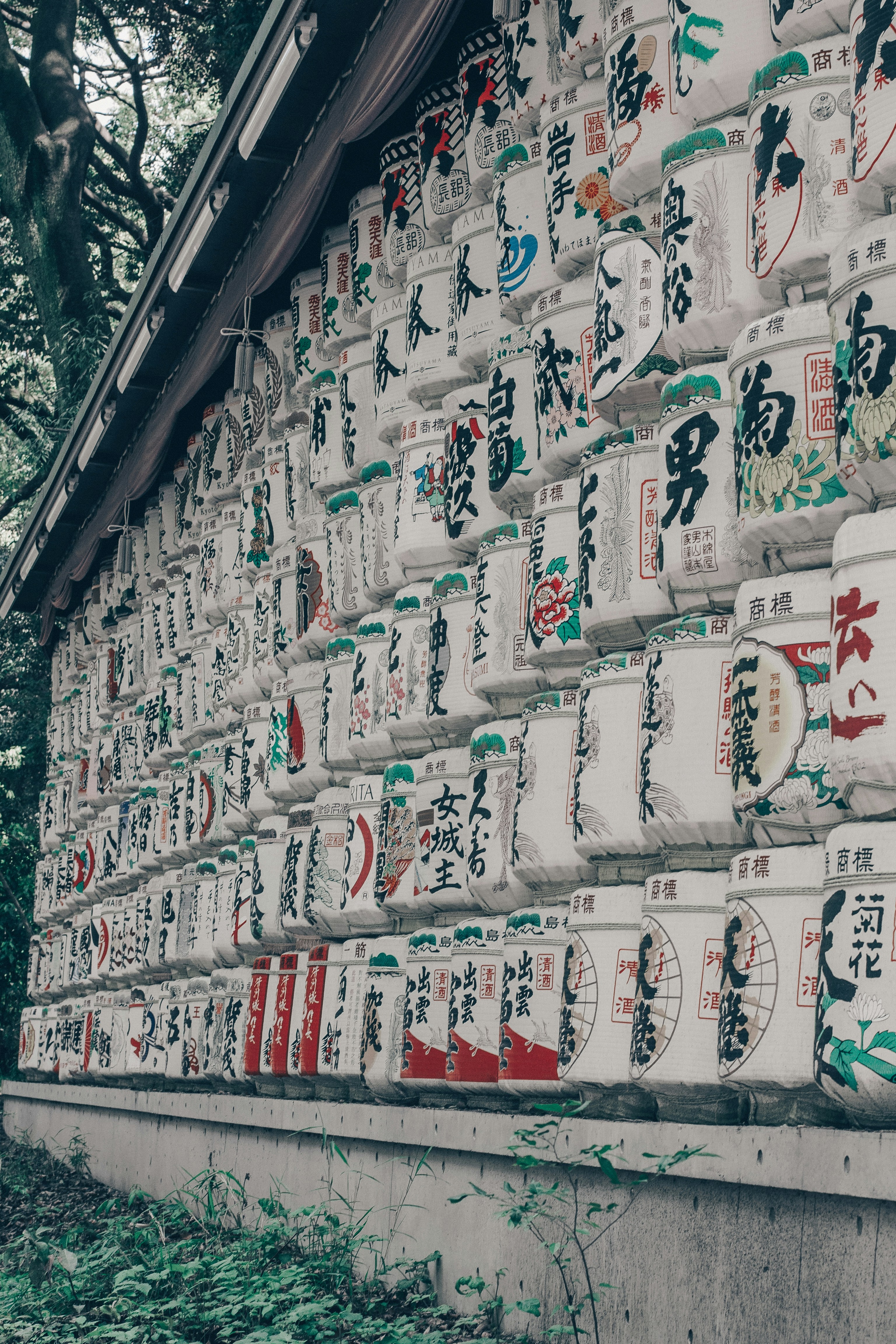 a wall covered in lots of different kinds of signs