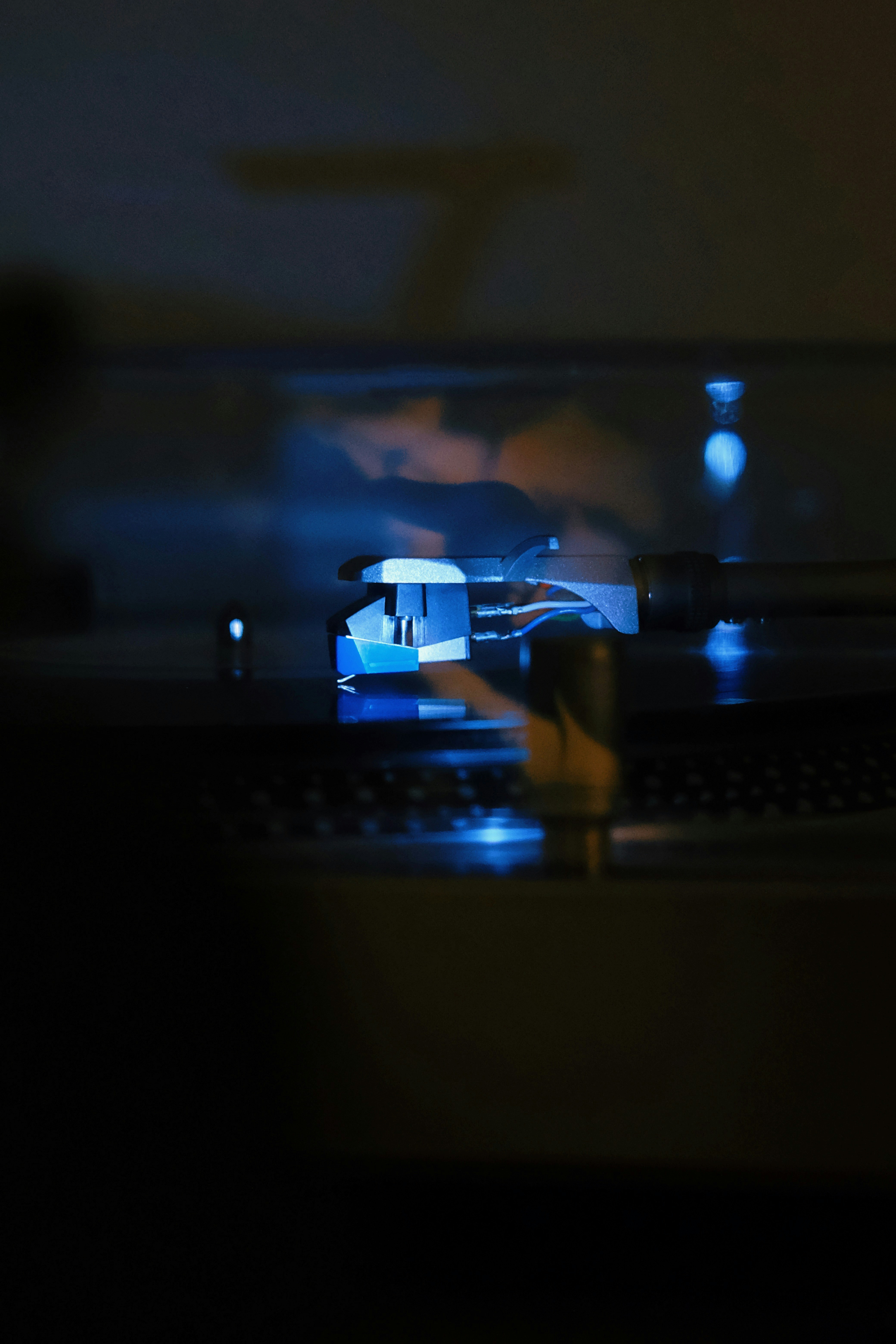 a blurry photo of a laptop computer with a blurry image of a car