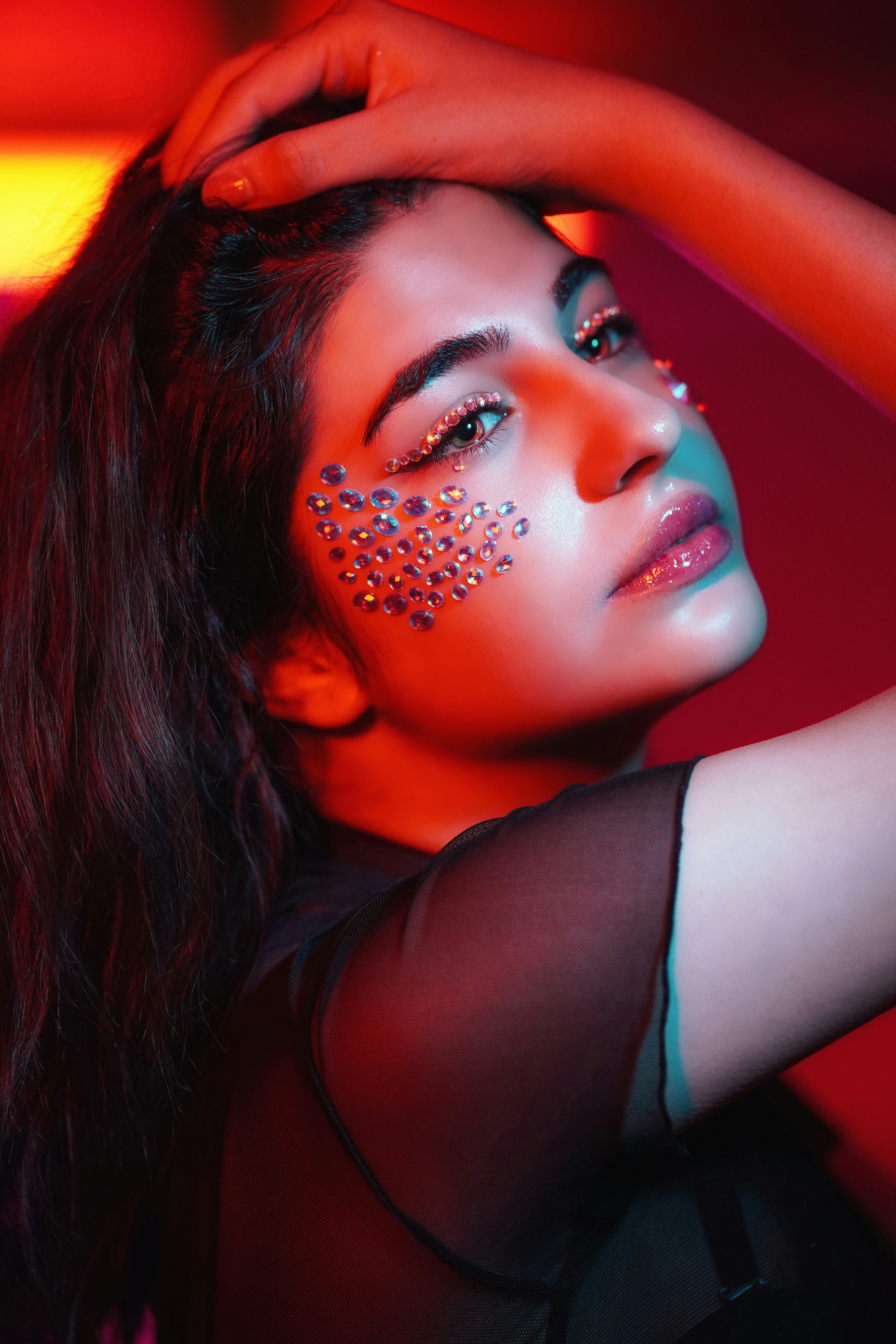 A woman with makeup on posing for a picture photo – Free Person Image ...