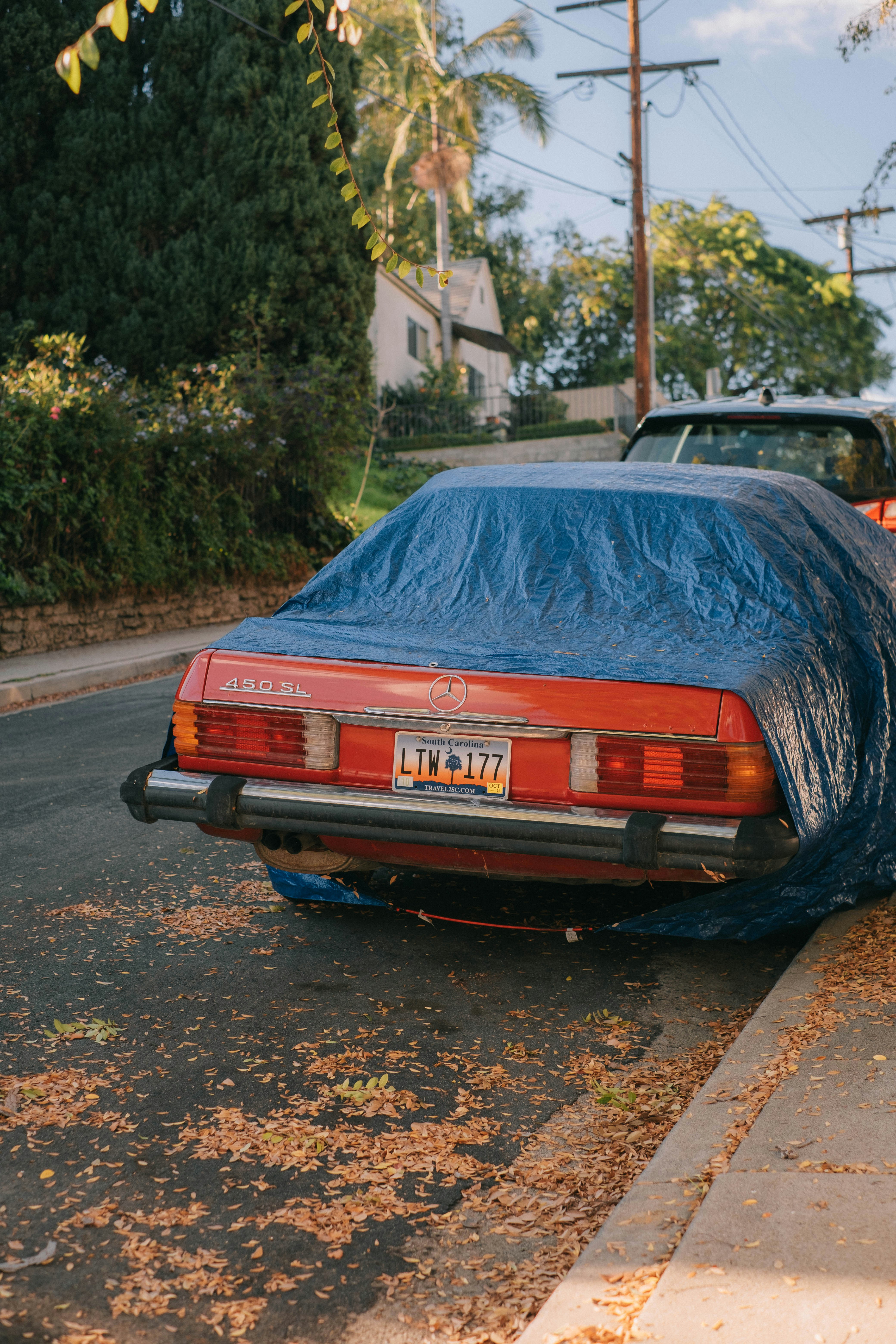 Azure Car Shelter on a Quiet Street