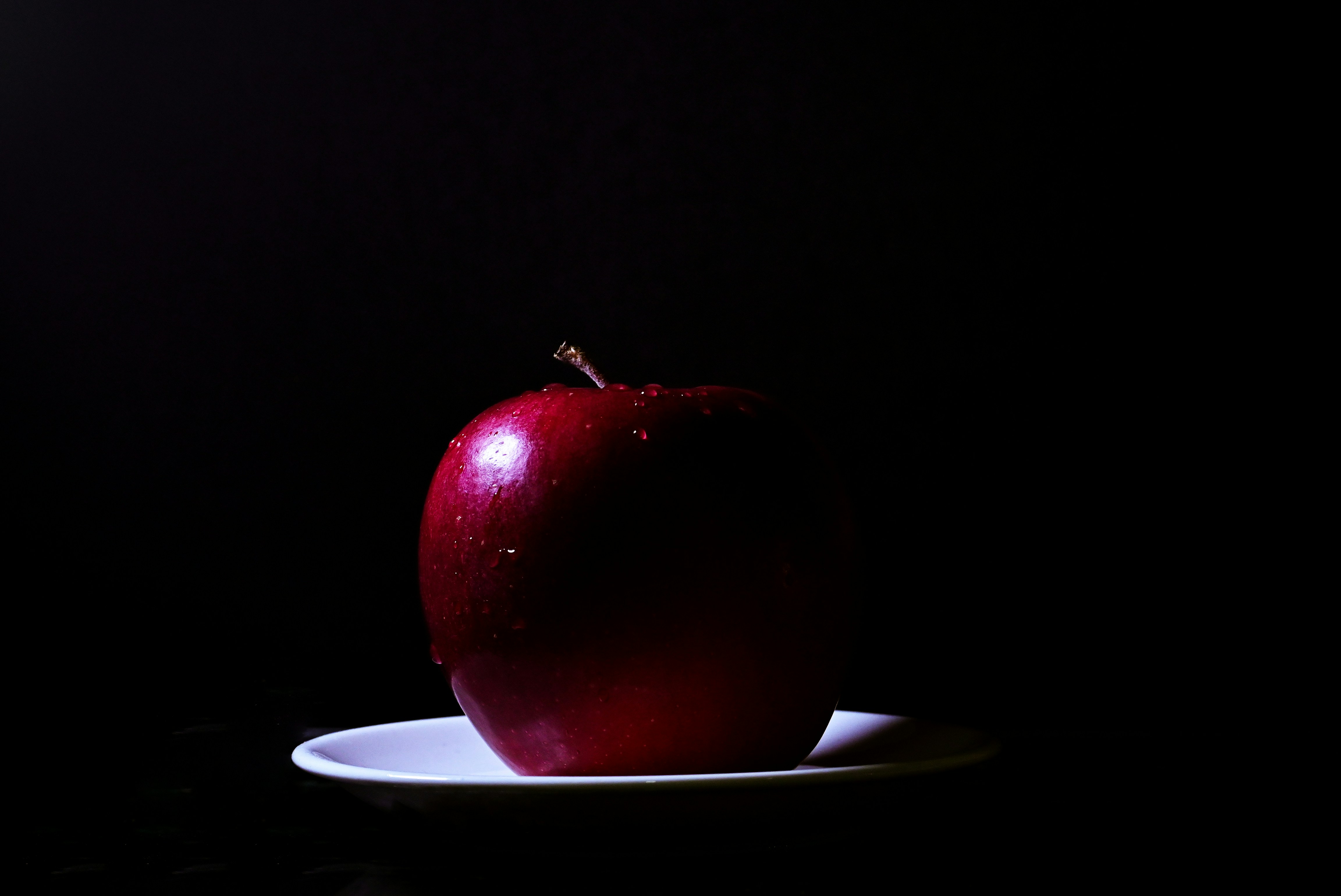 Red Apple on Black Background