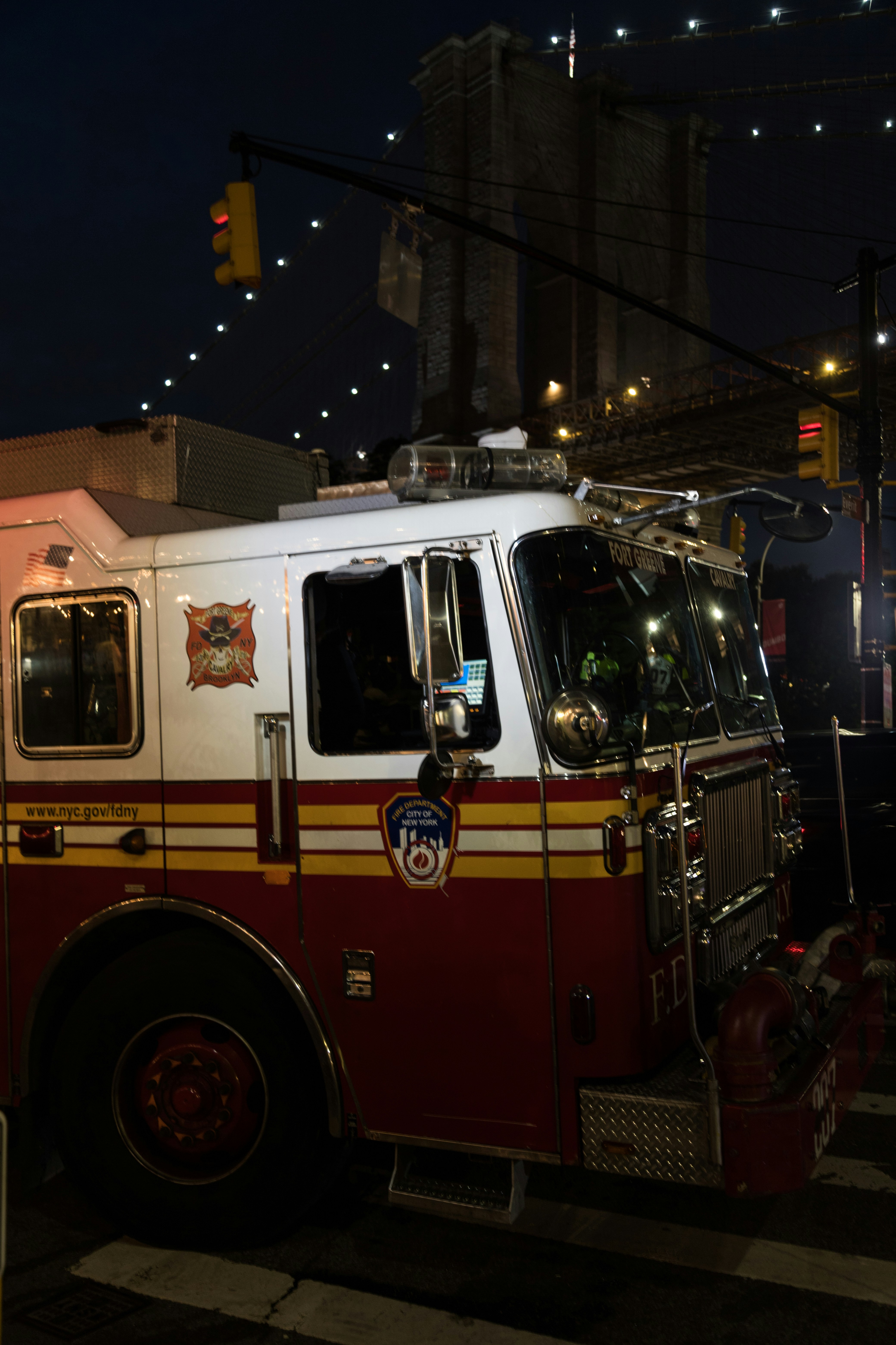 Crimson Chrome Under Neon: A Night Fire Engine at the City Intersection