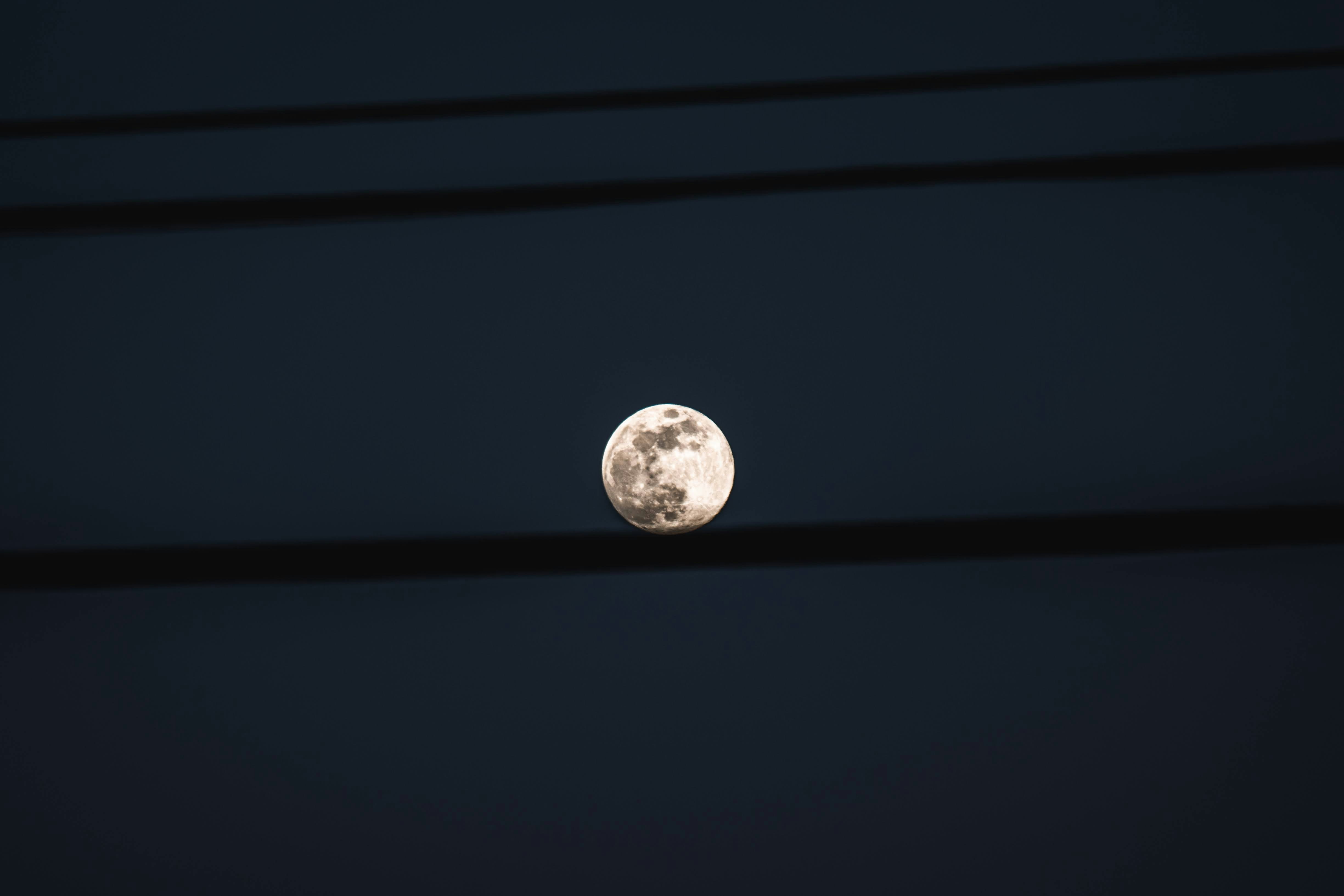 A full moon seen through power lines at night photo – Free Geometric ...
