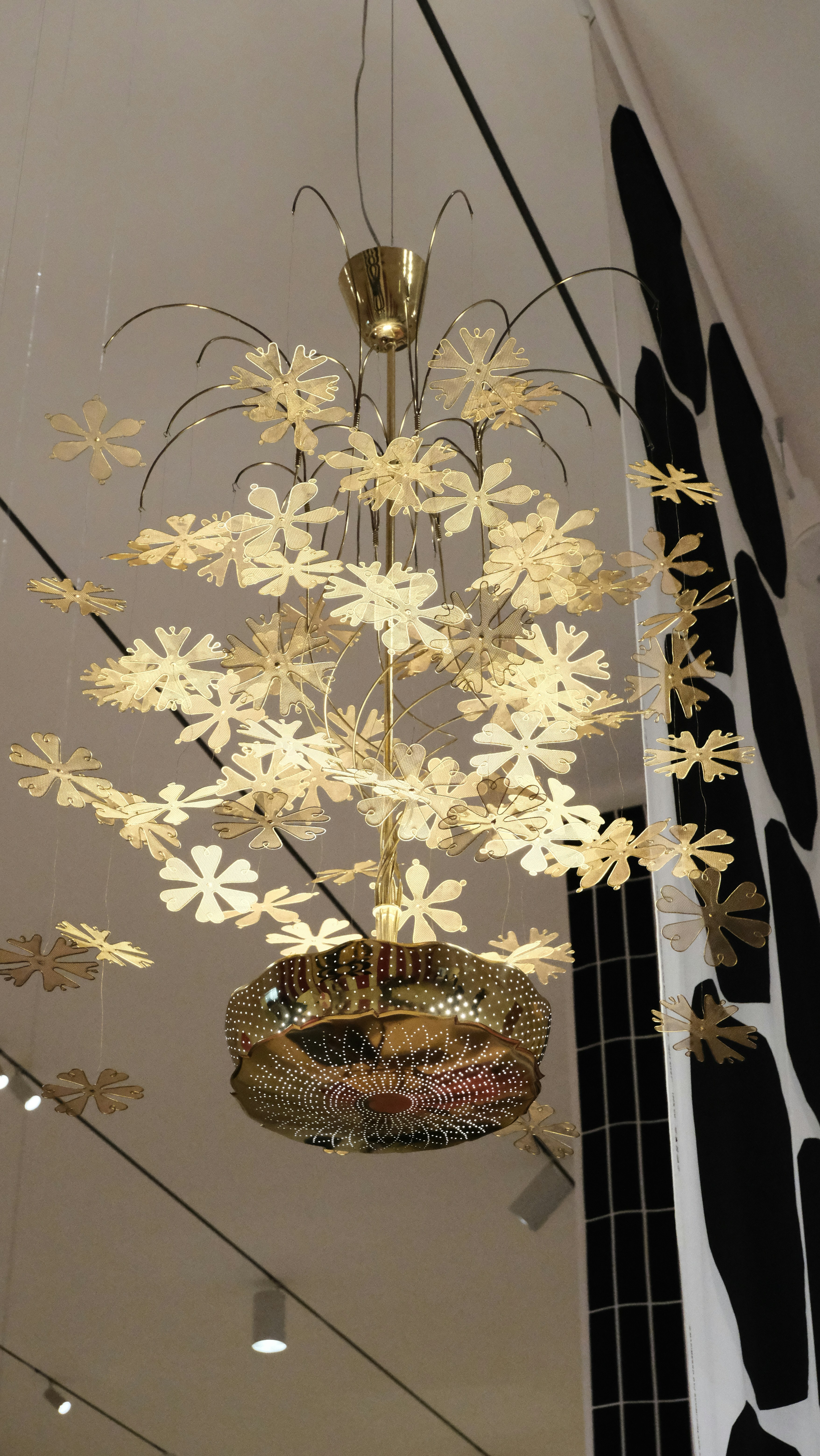 a chandelier hanging from the ceiling of a building