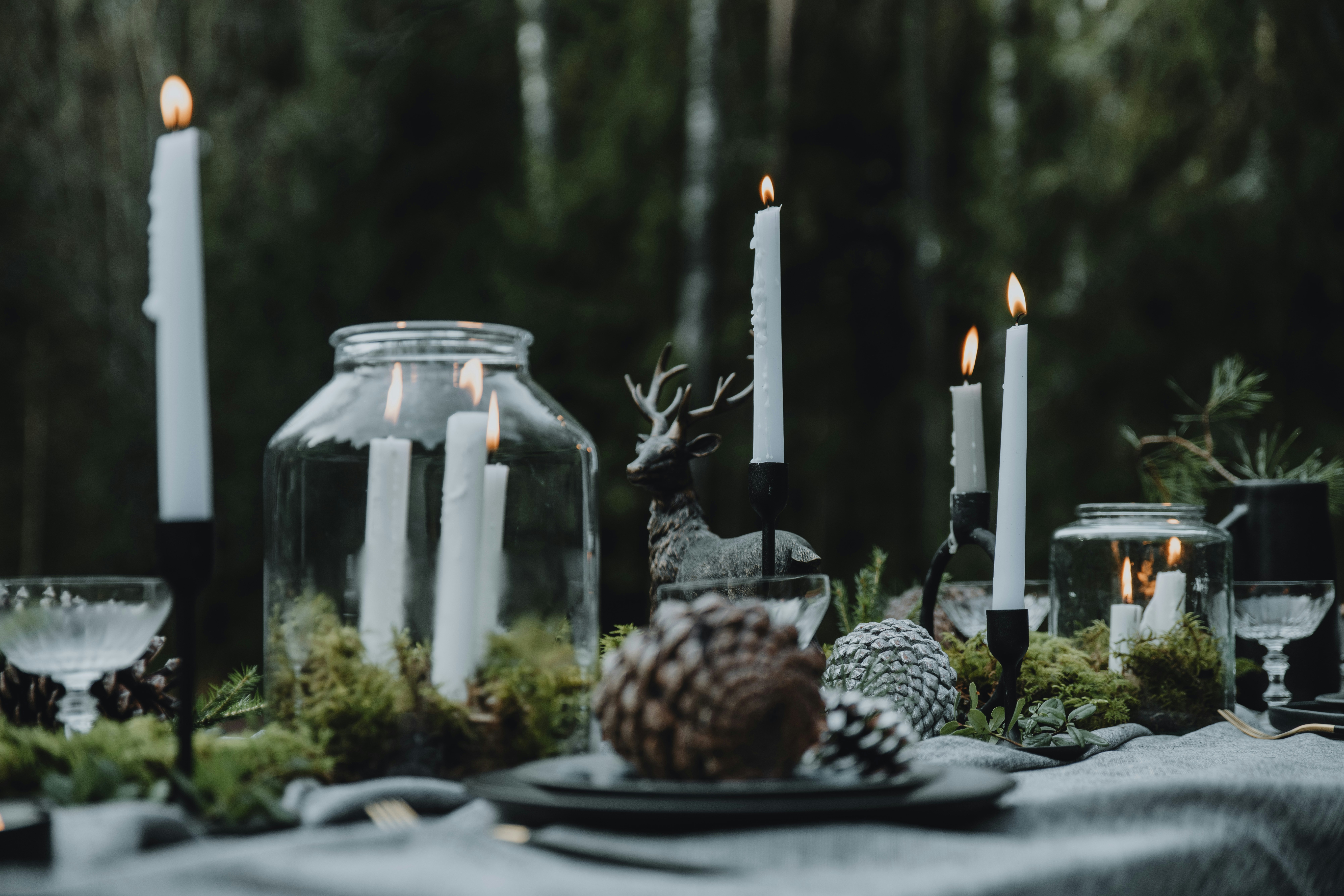 Candlelit Woodland Tablescape with Glass Jar and Pinecone Accents