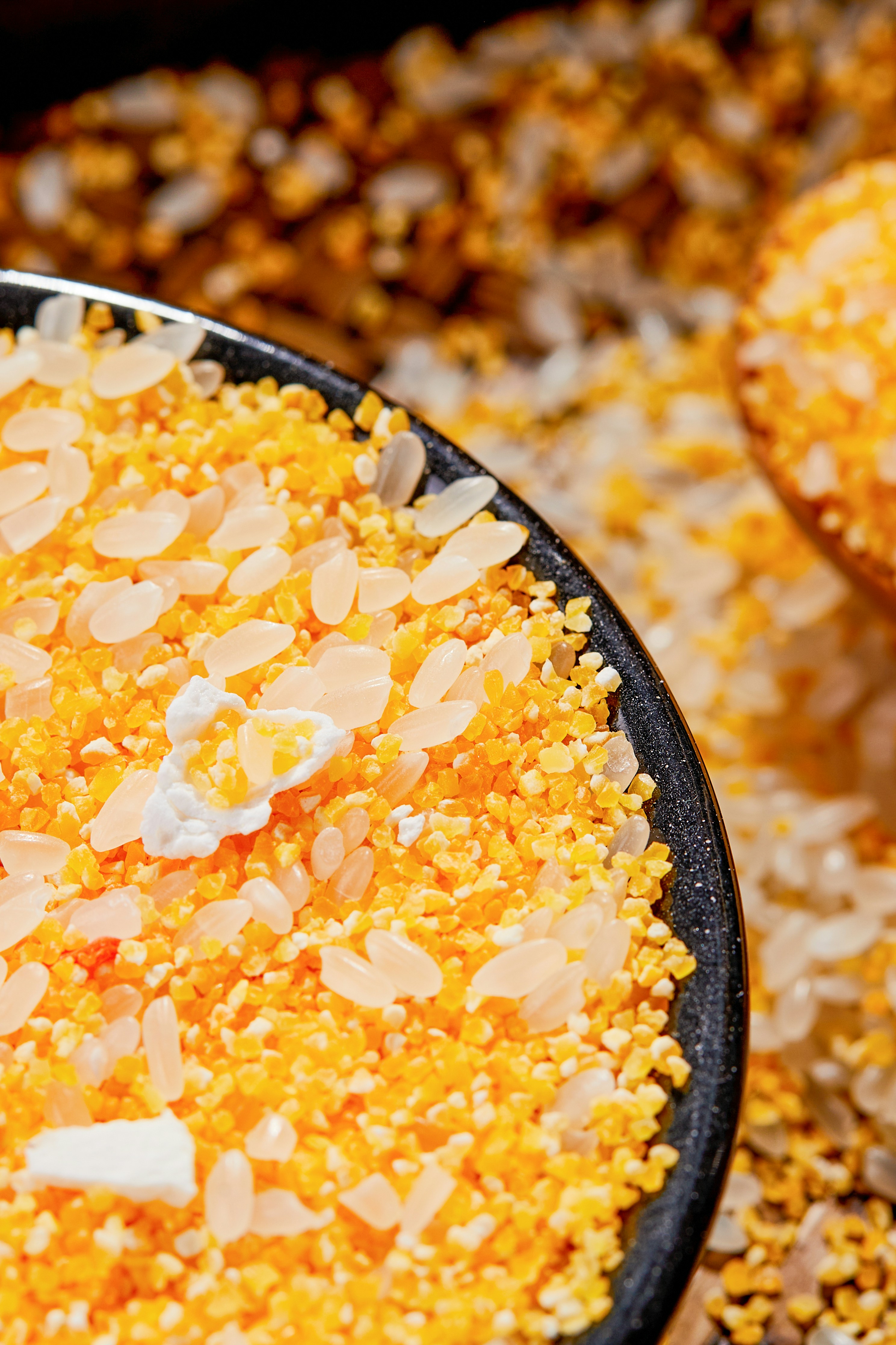 Golden Crunch: A Close-Up of Sugar Crystals in a Pan