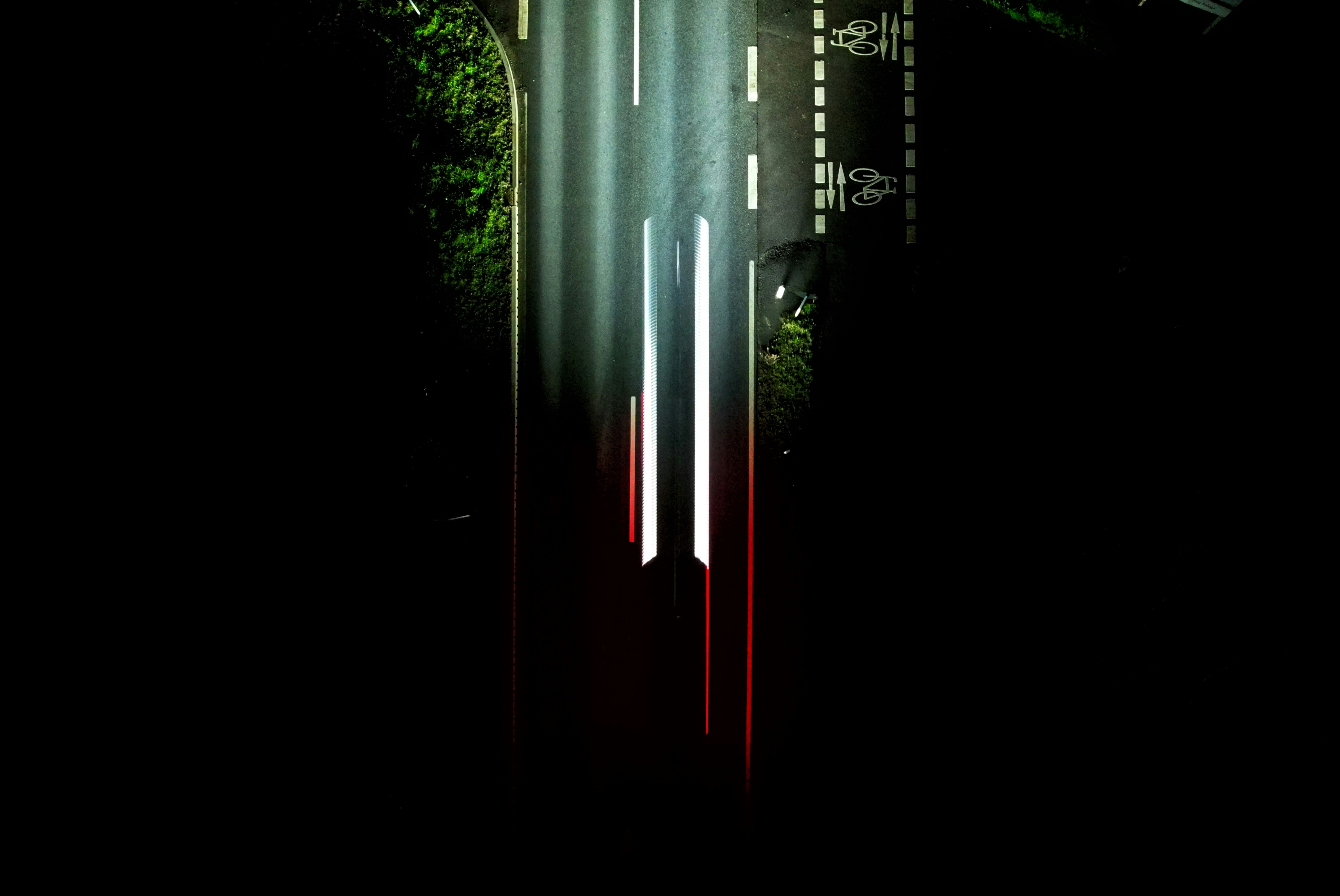 Neon Veins Down a Quiet Night Road
