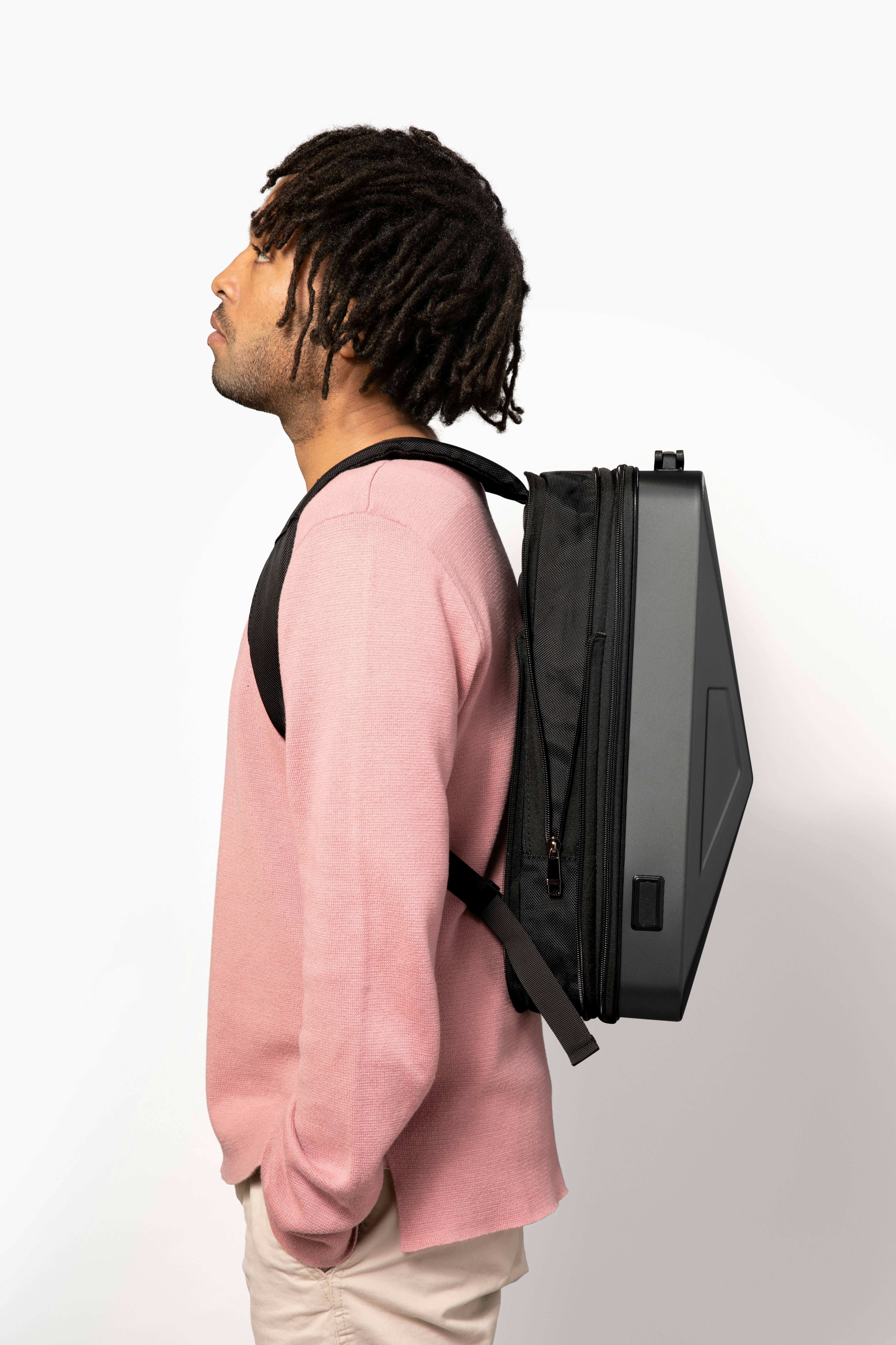 A man with dreadlocks wearing a backpack photo – Free Image on Unsplash