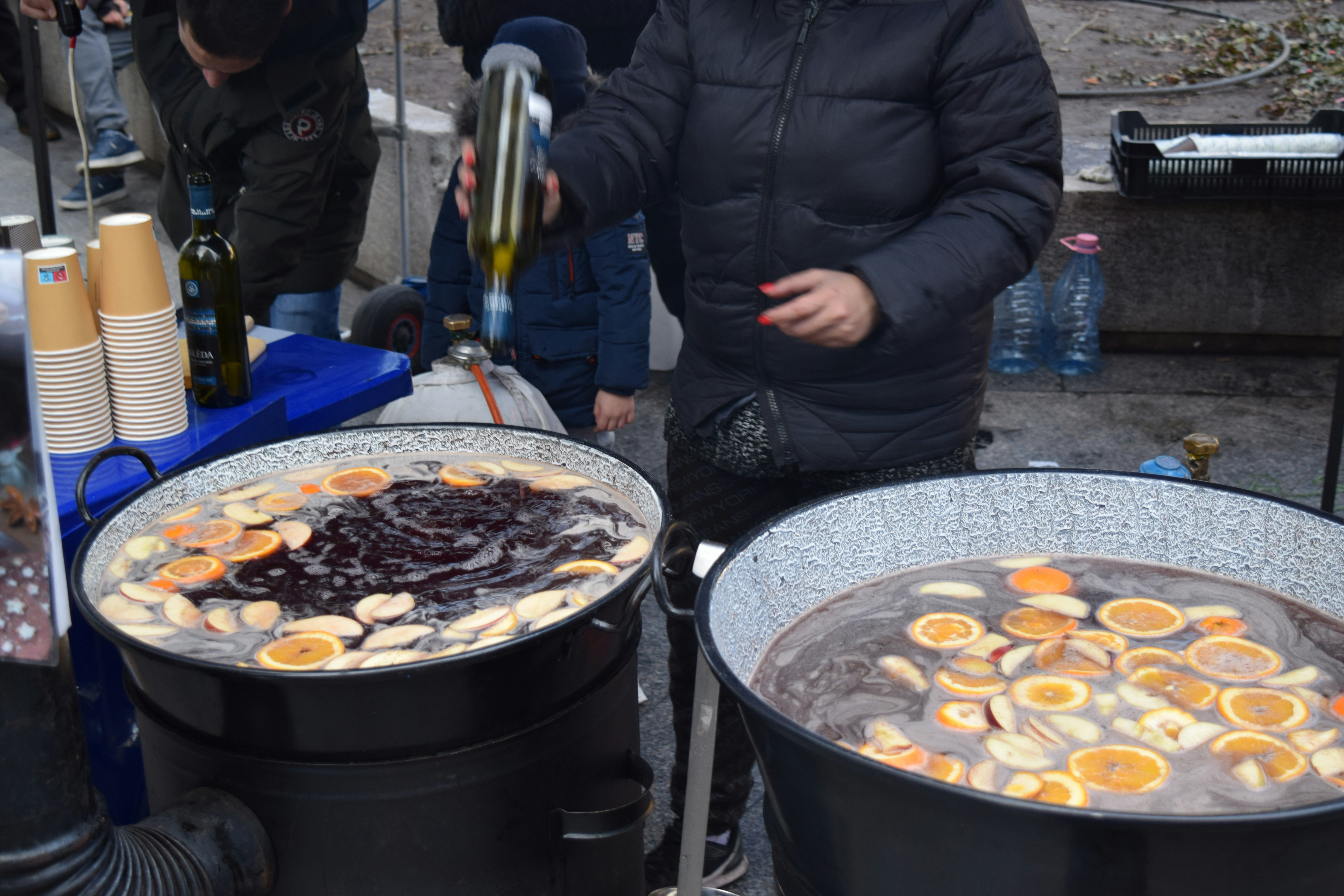 Citrus-Infused Broths Boiling at a Busy Street Food Stall