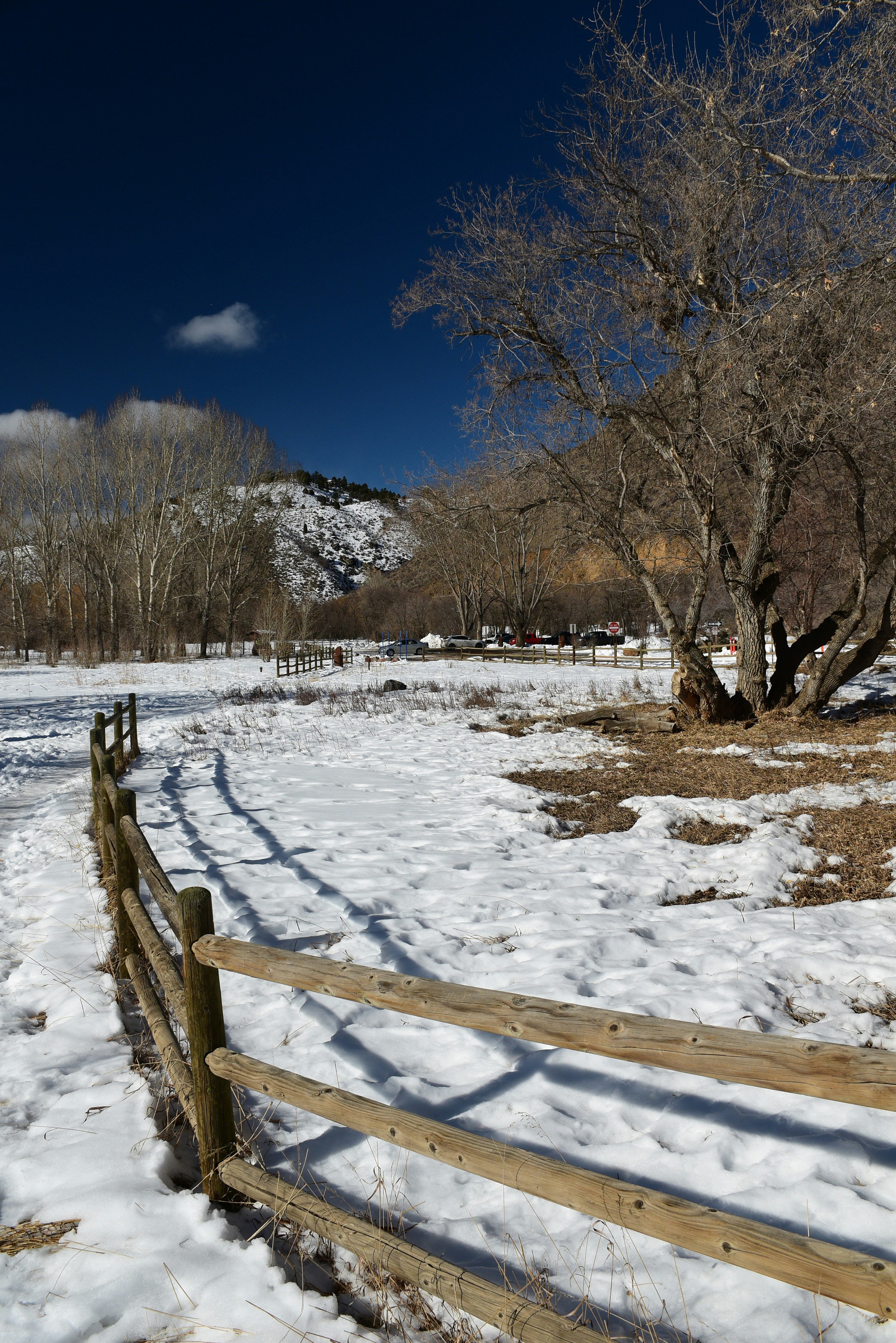 A snow covered field with a wooden fence photo – Free Idledale Image on ...