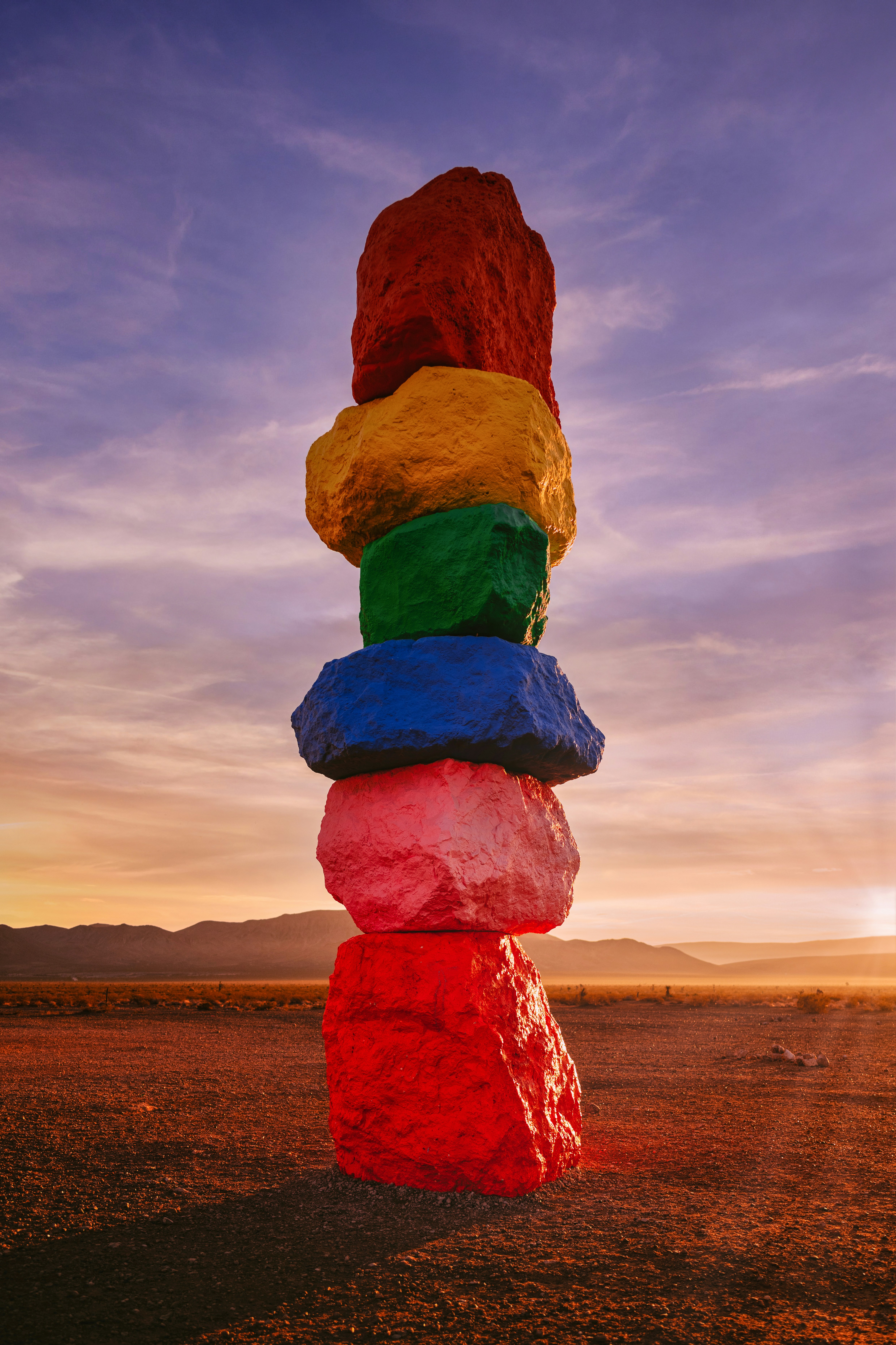 A stack of rocks sitting in the middle of a desert photo – Free Seven ...