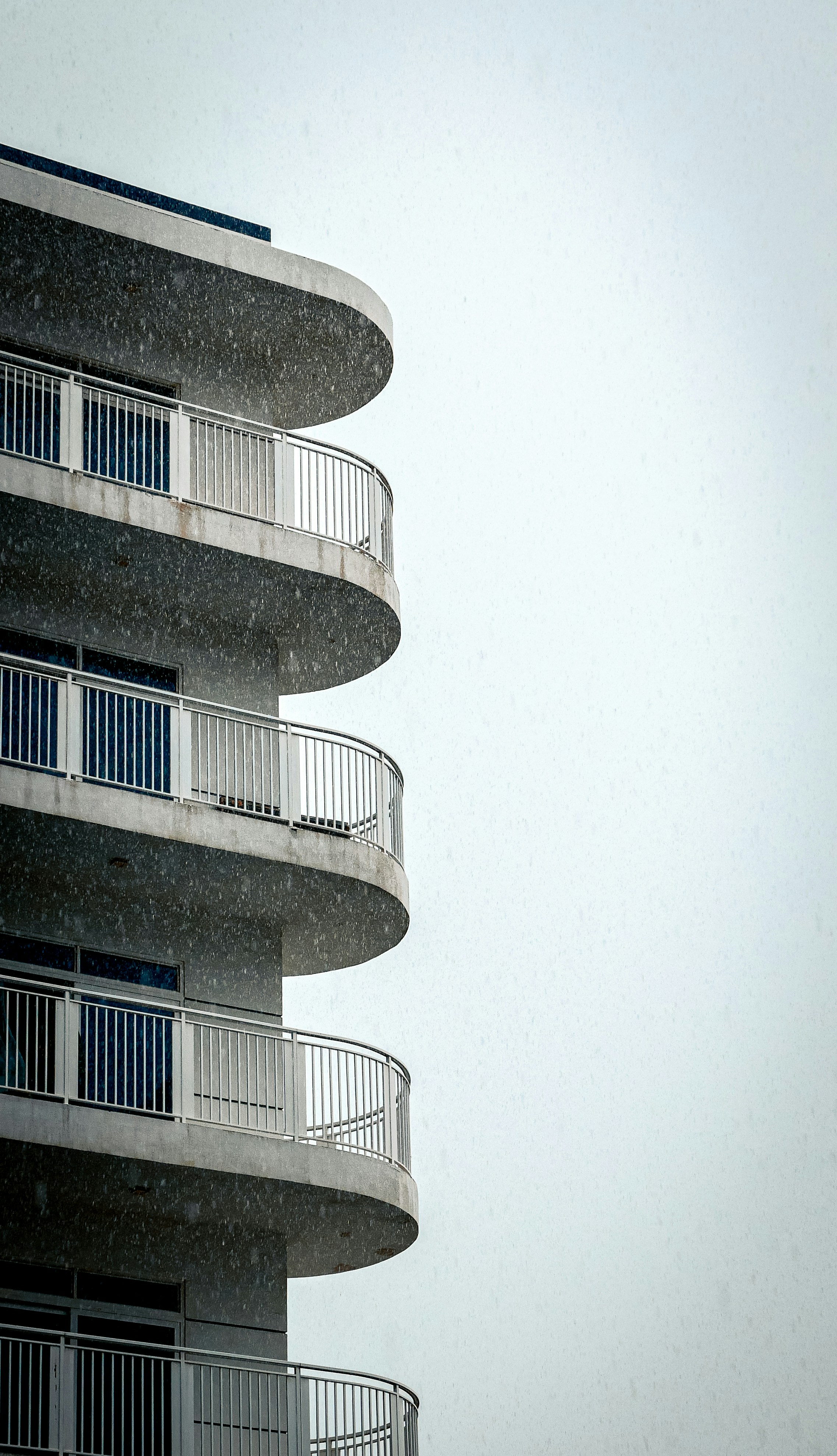 a tall building with balconies and balconies on the balconies
