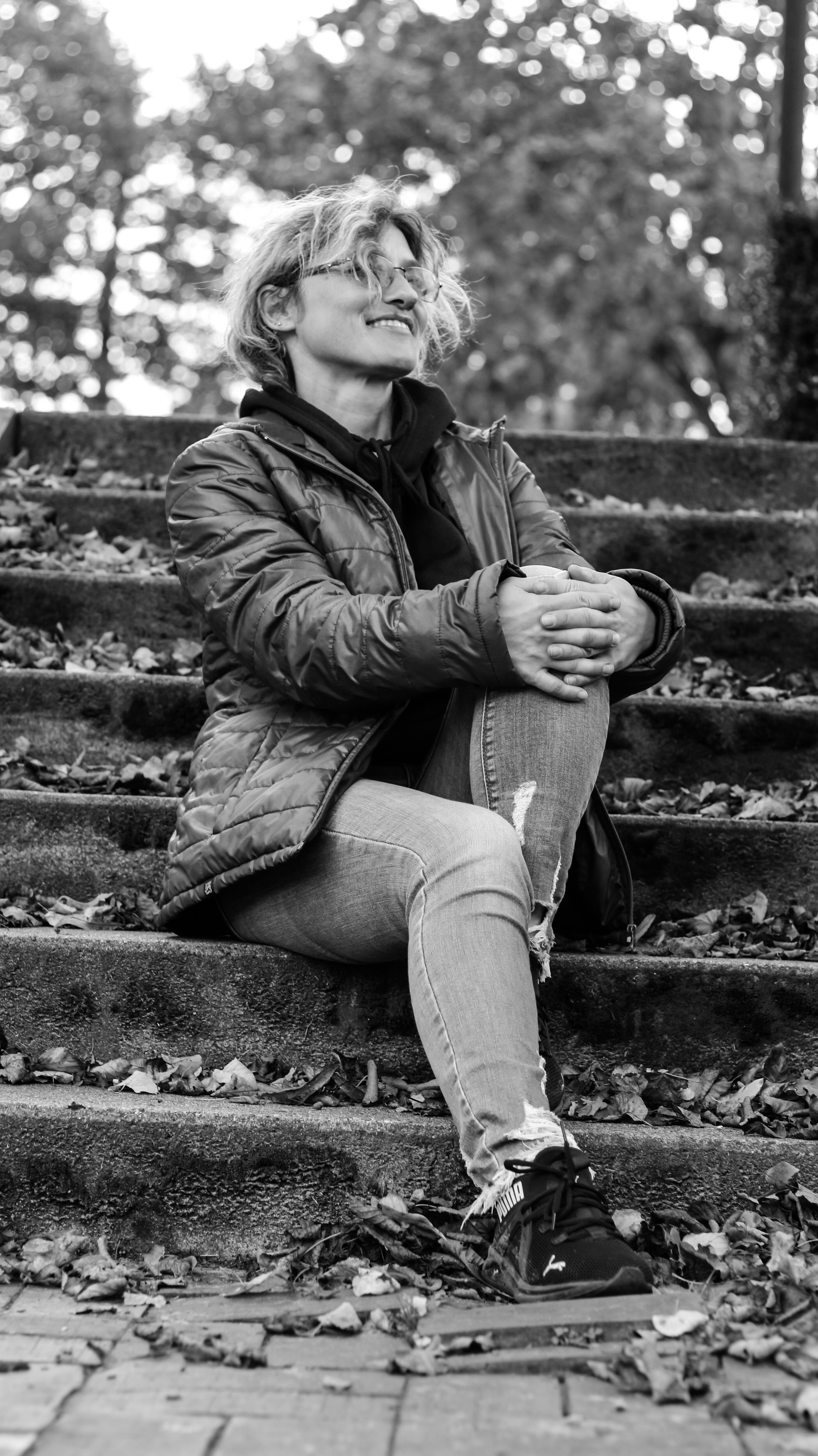Portrait on Weathered Steps: Quiet Confidence in Fall Light