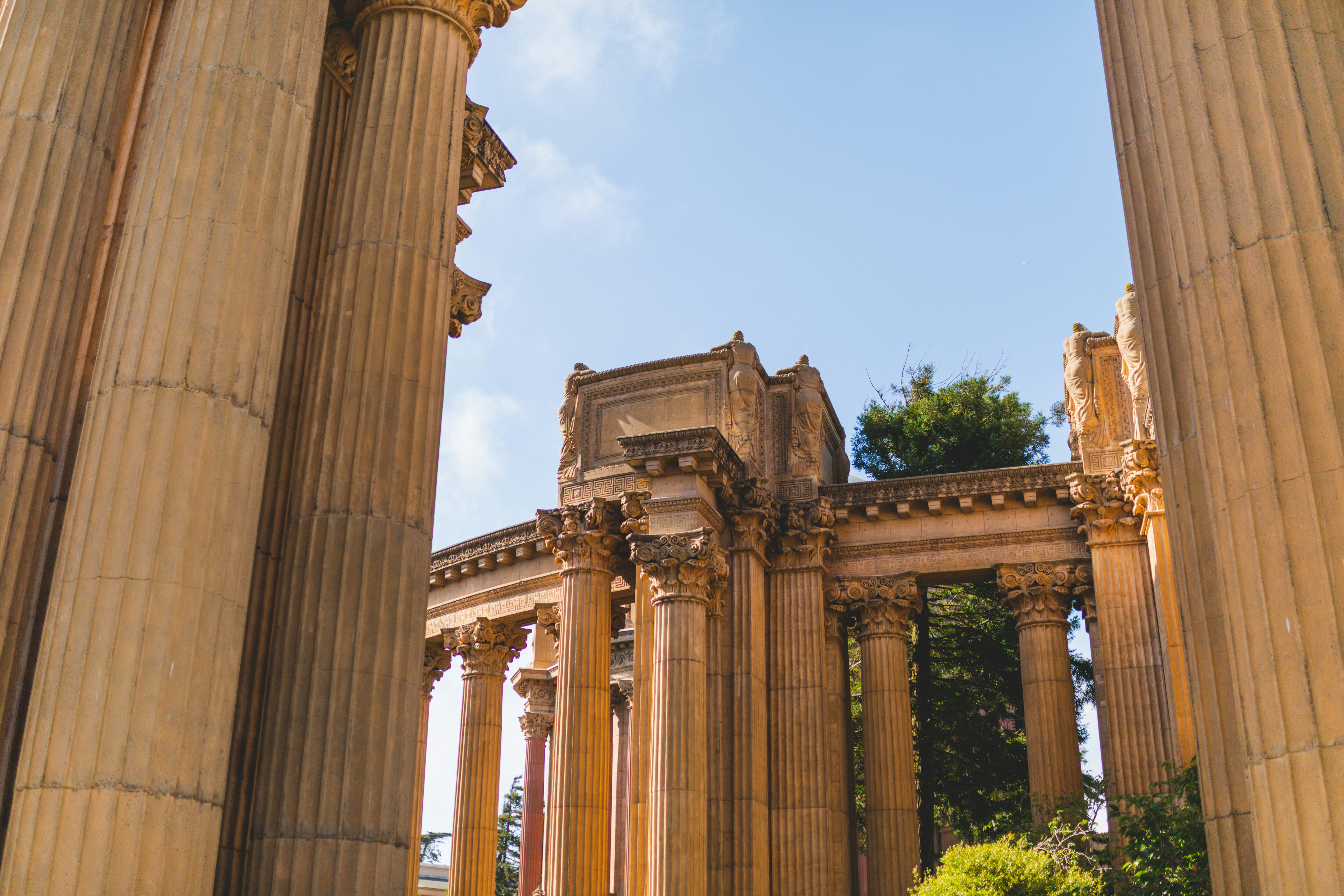 A group of large pillars sitting next to each other photo – Free ...