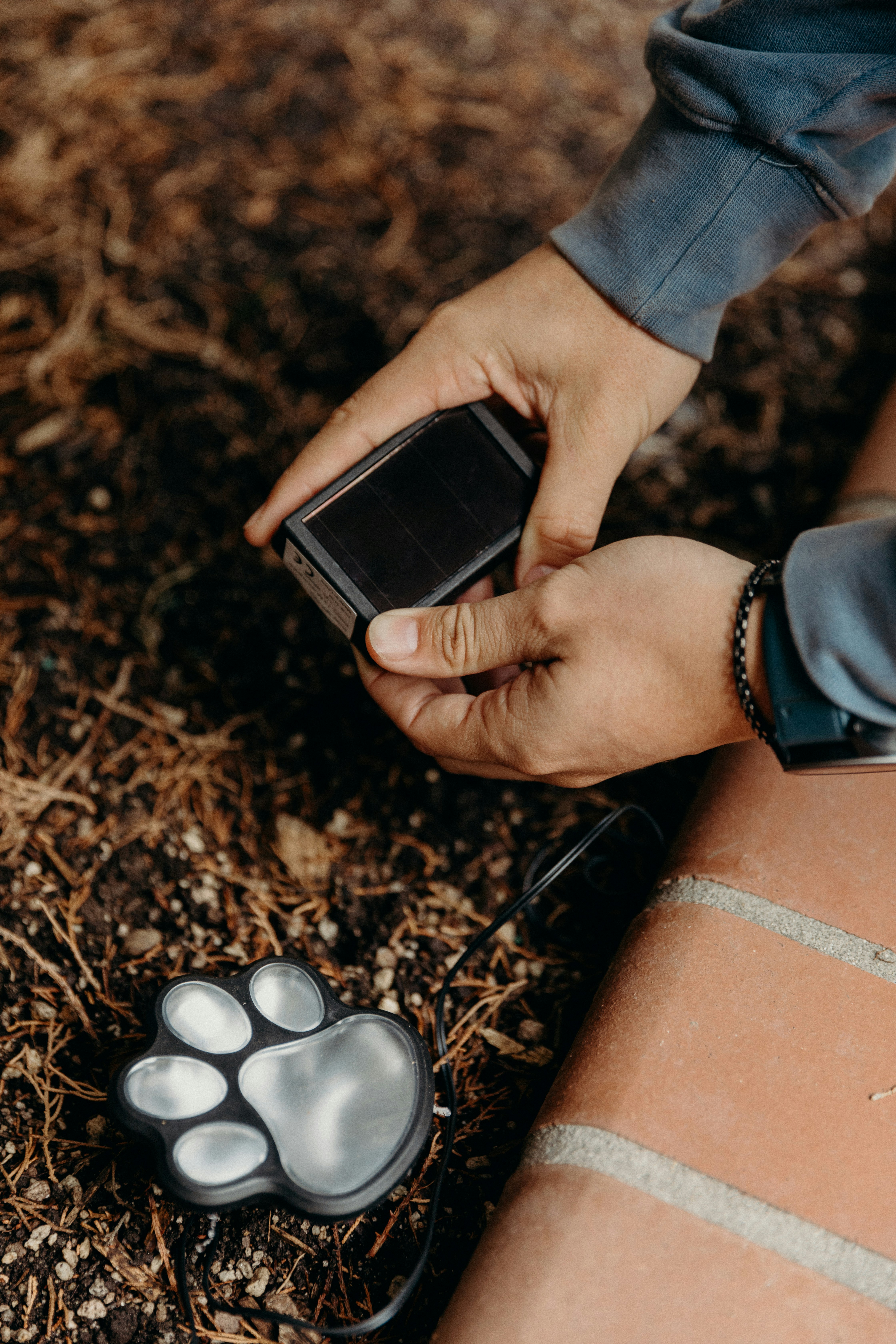 Hands at the Micro-Scale: A Battery-Powered Moment with a Tiny Solar Panel
