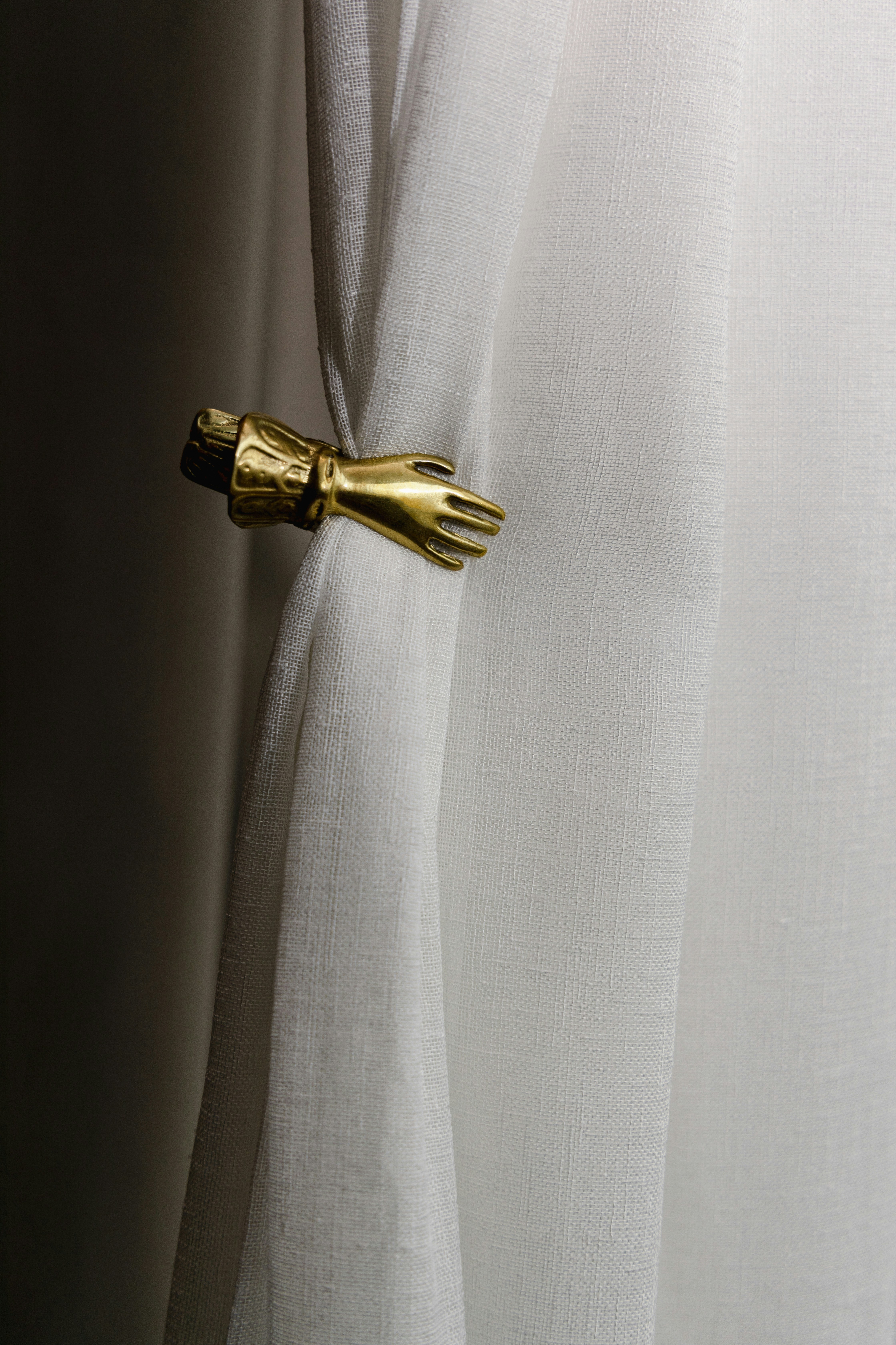 A close up of a curtain with a gold handle on it photo – Free Fashion ...