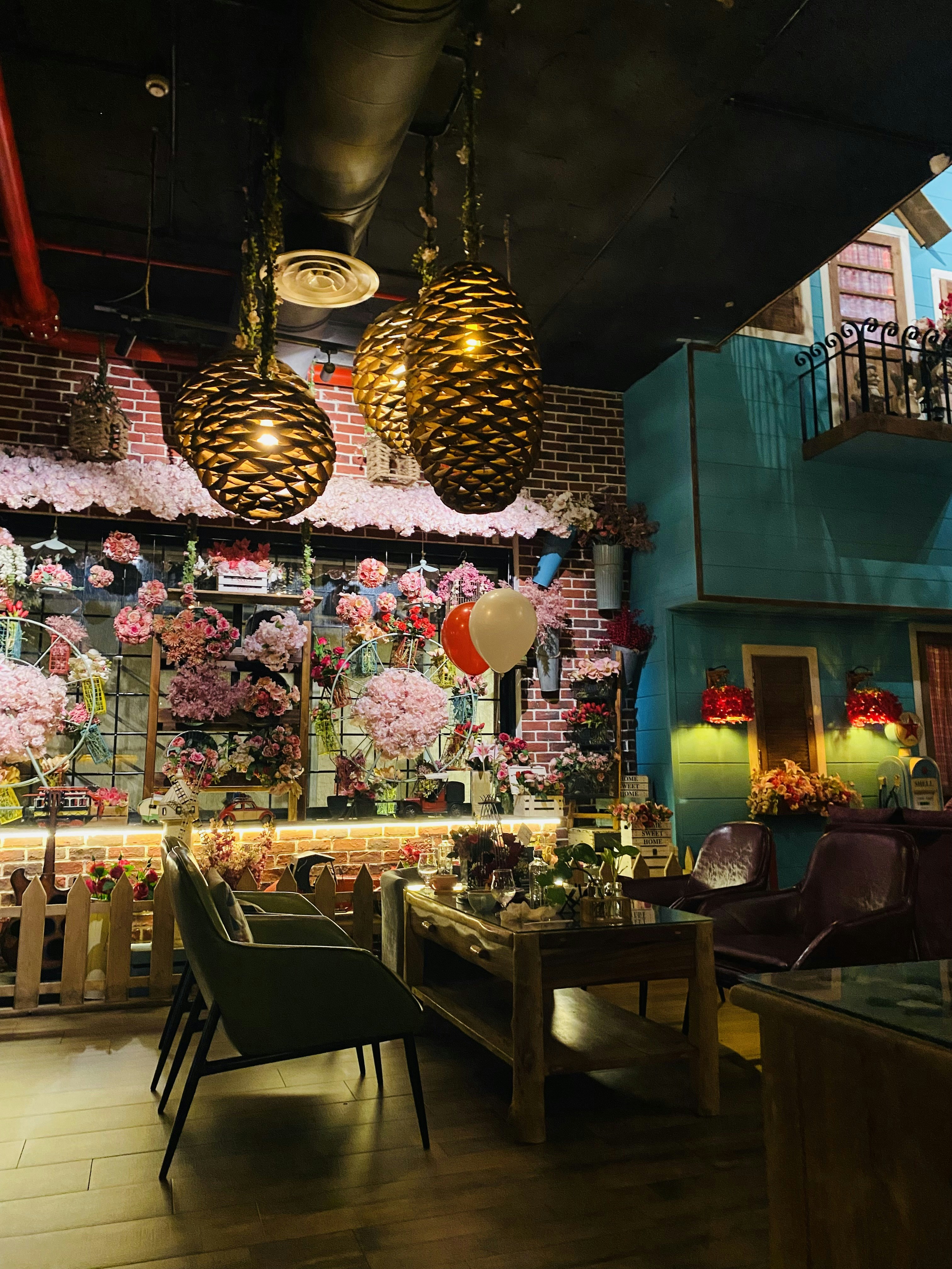 Floral Café Glow: A Cozy Night Among Lanterns and Bougainvillea