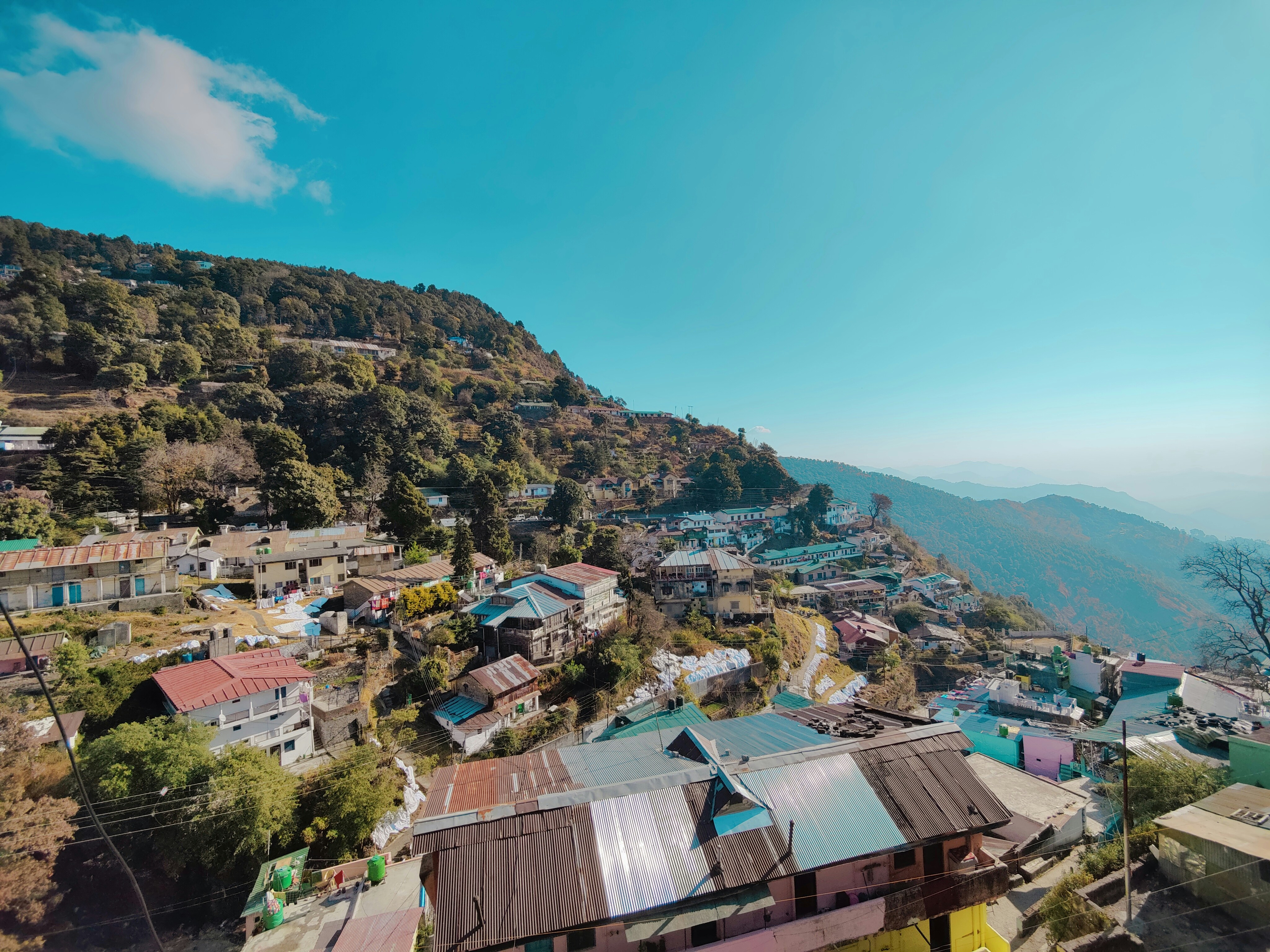 Ridgeview Hamlet: Colorful Rooftops Sloping Along the Hillside