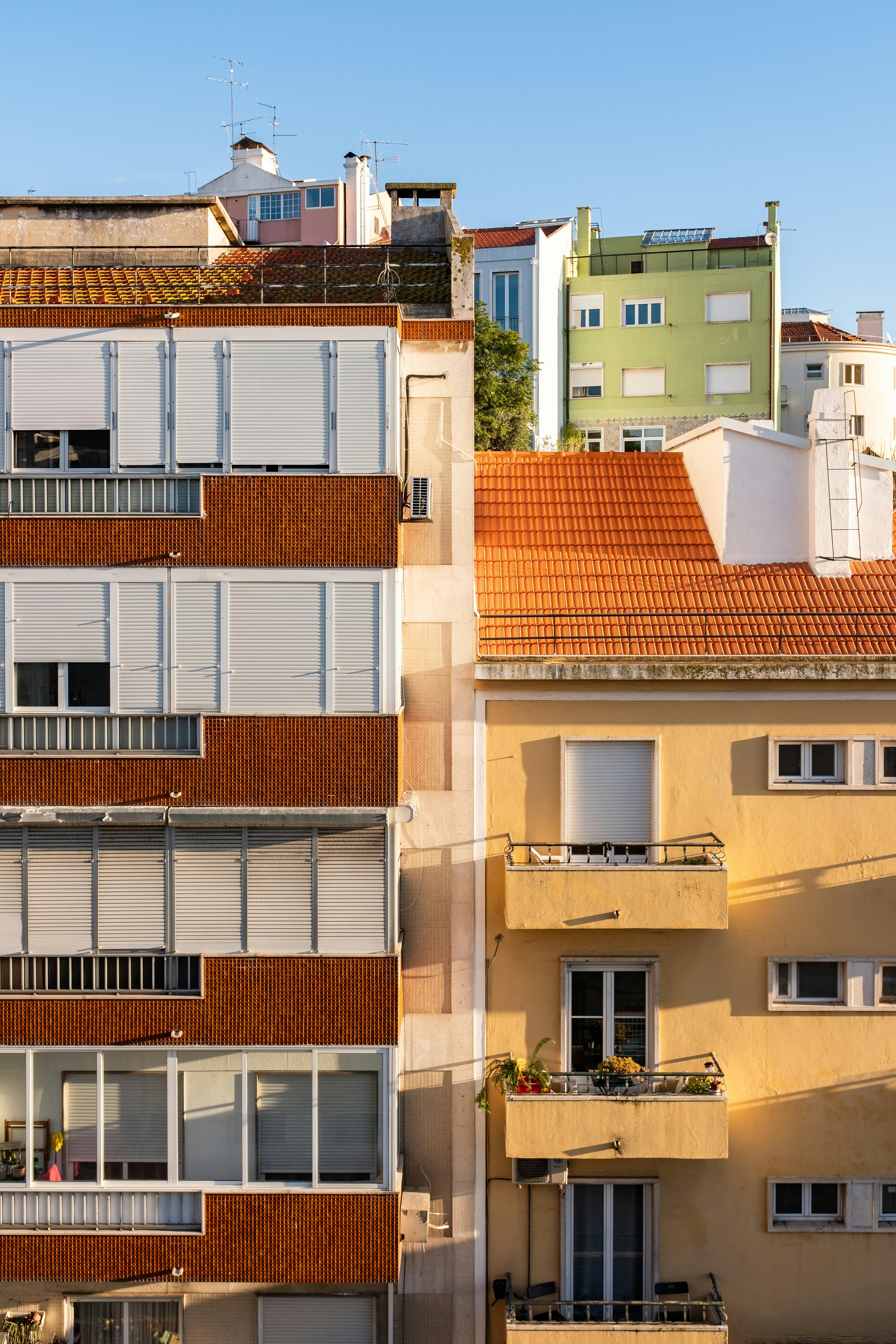 Terracotta and Amber: A Sunlit Split-Facade Cityscape