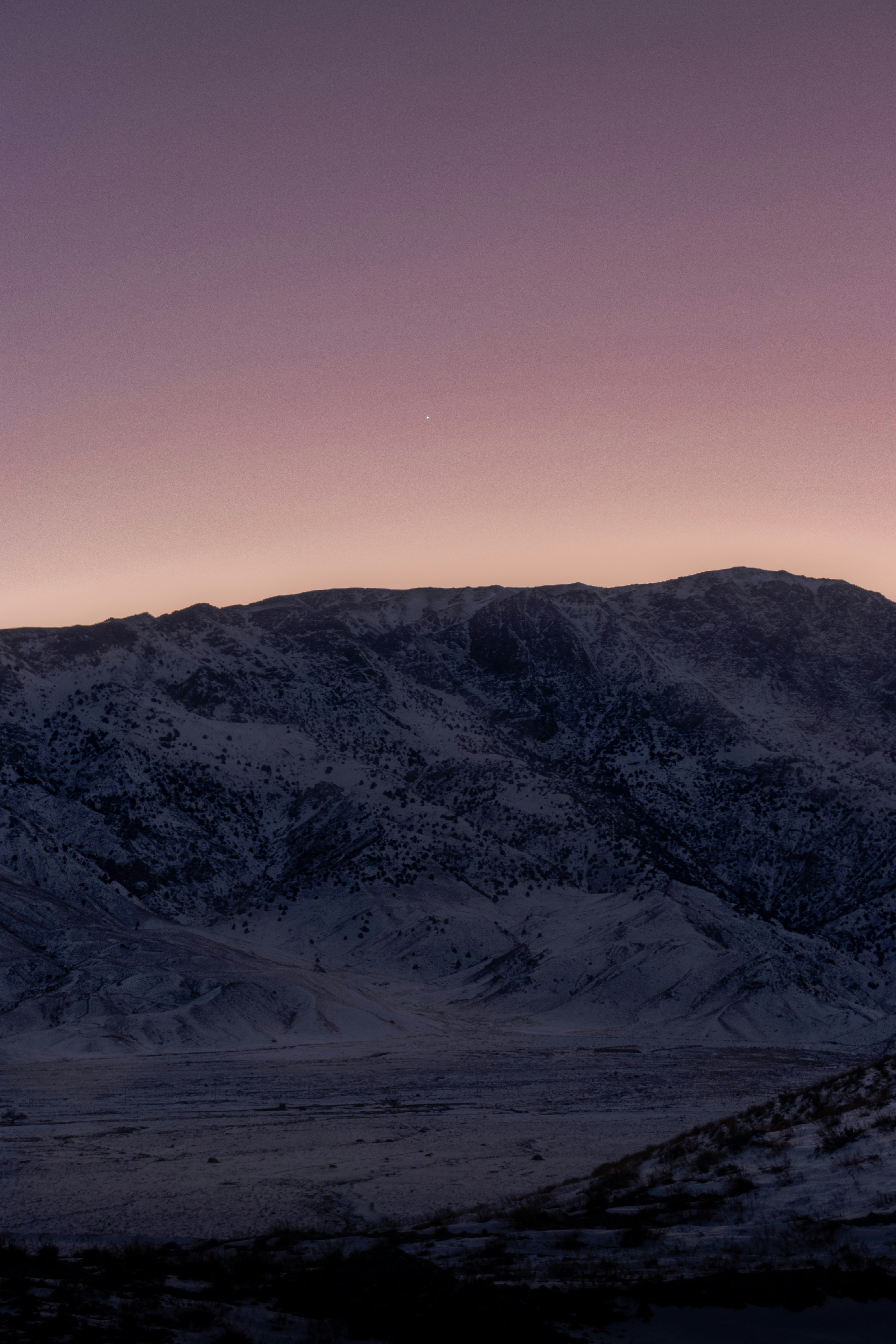 The moon is setting over a mountain range photo – Free Torbat-e-jam ...