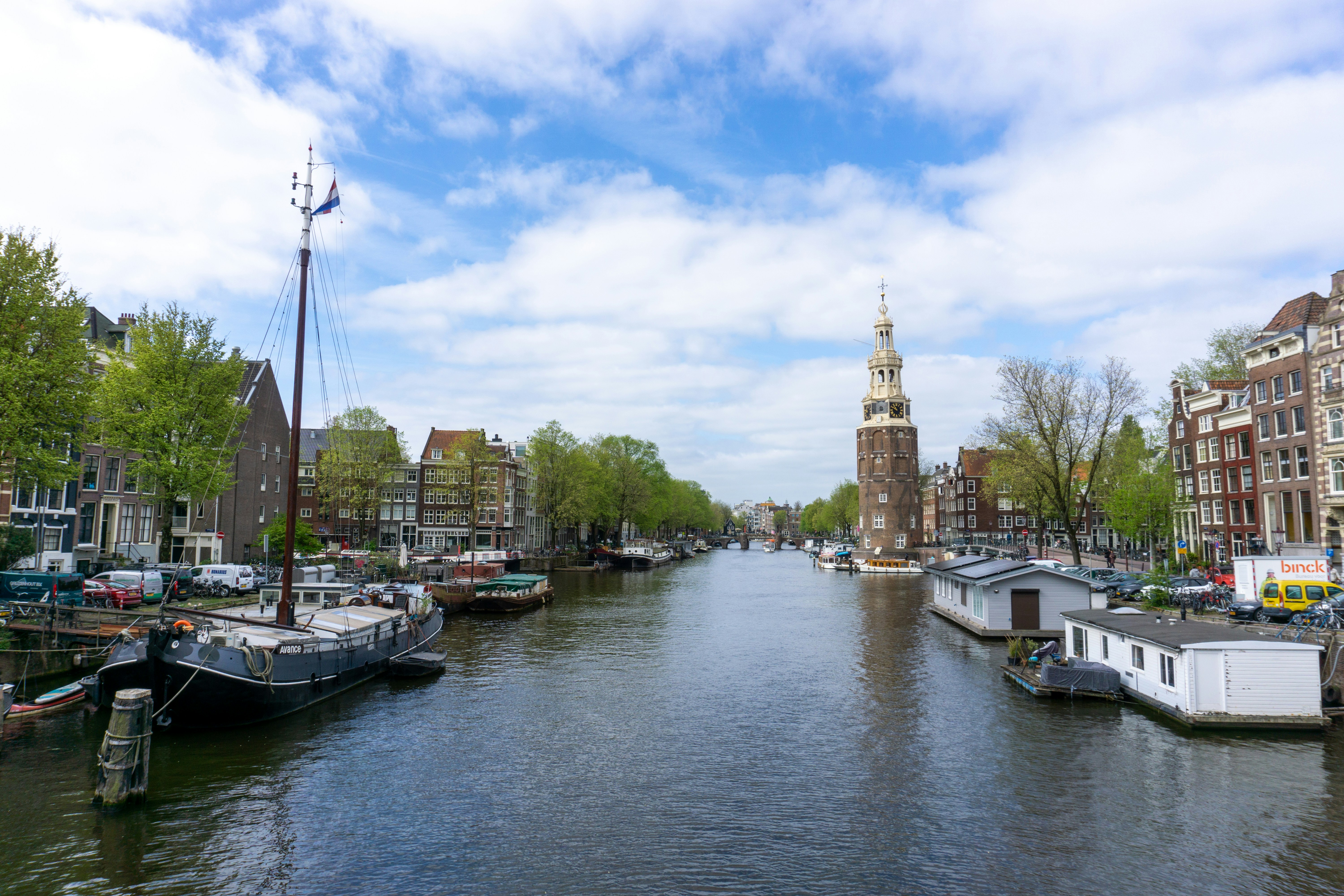 Canal Pulse: Boats, Bridges, and a Clocktower’s Silence