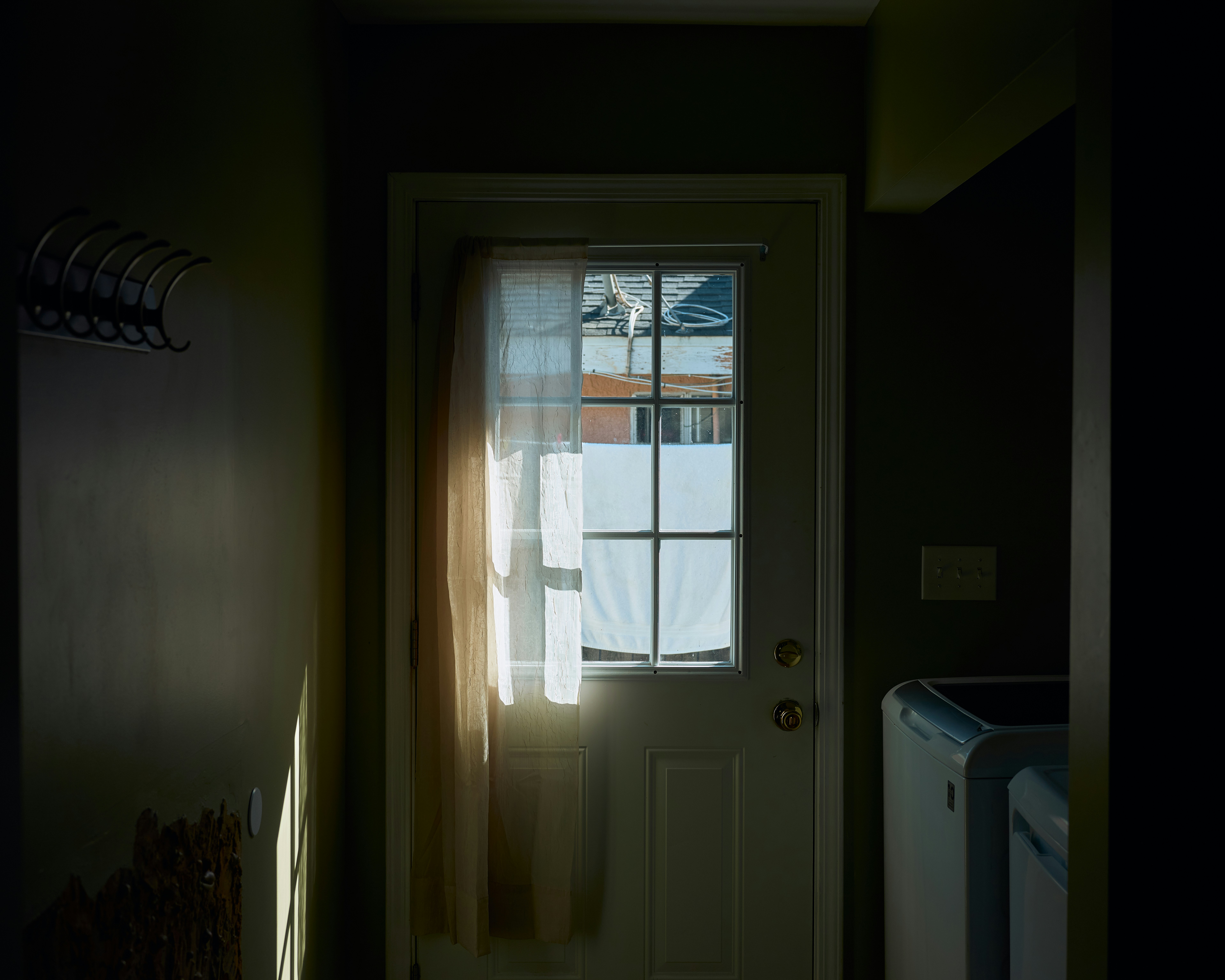 a door is open in a dark room