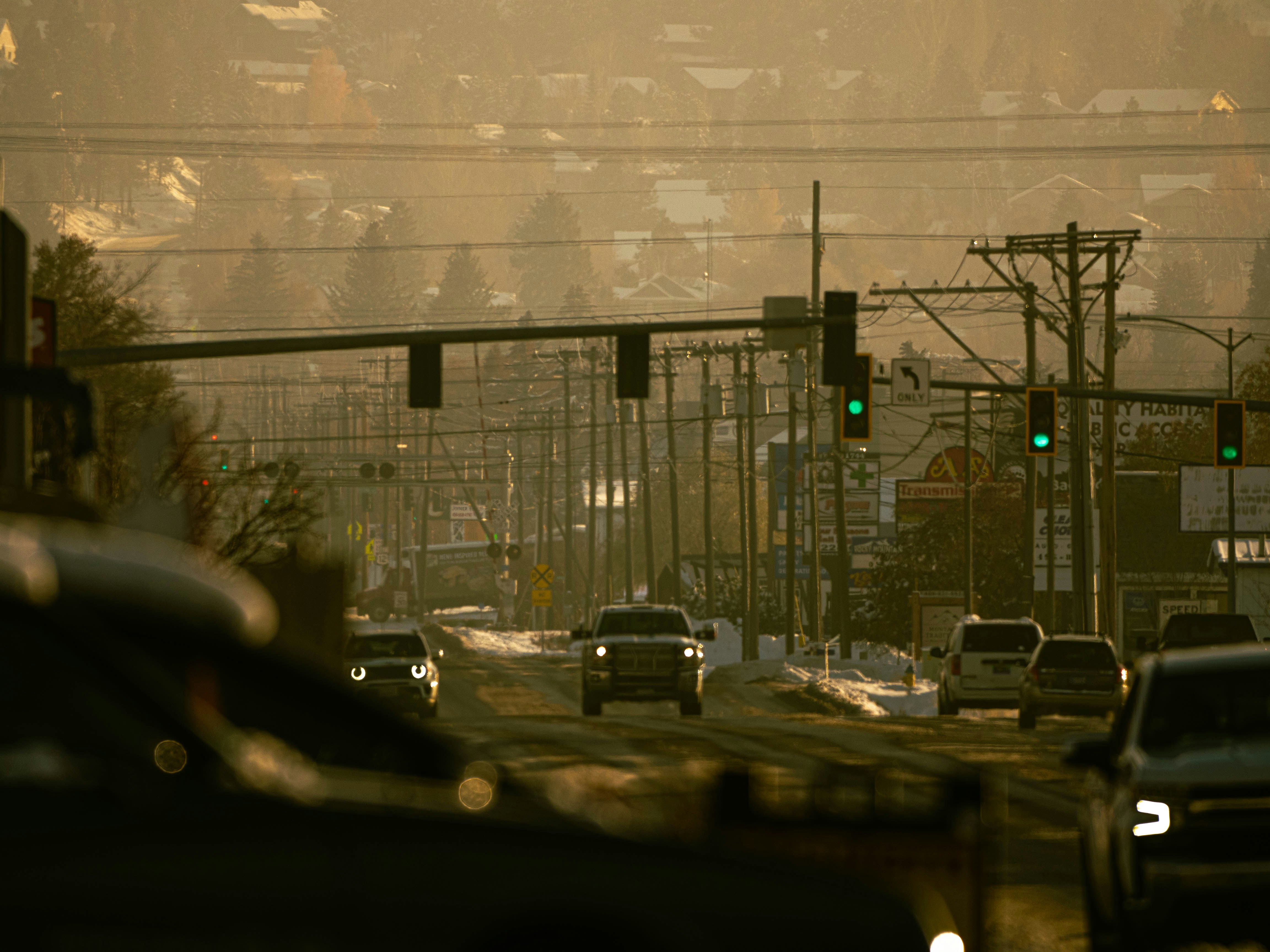 Cottony sunrise over a quiet urban intersection