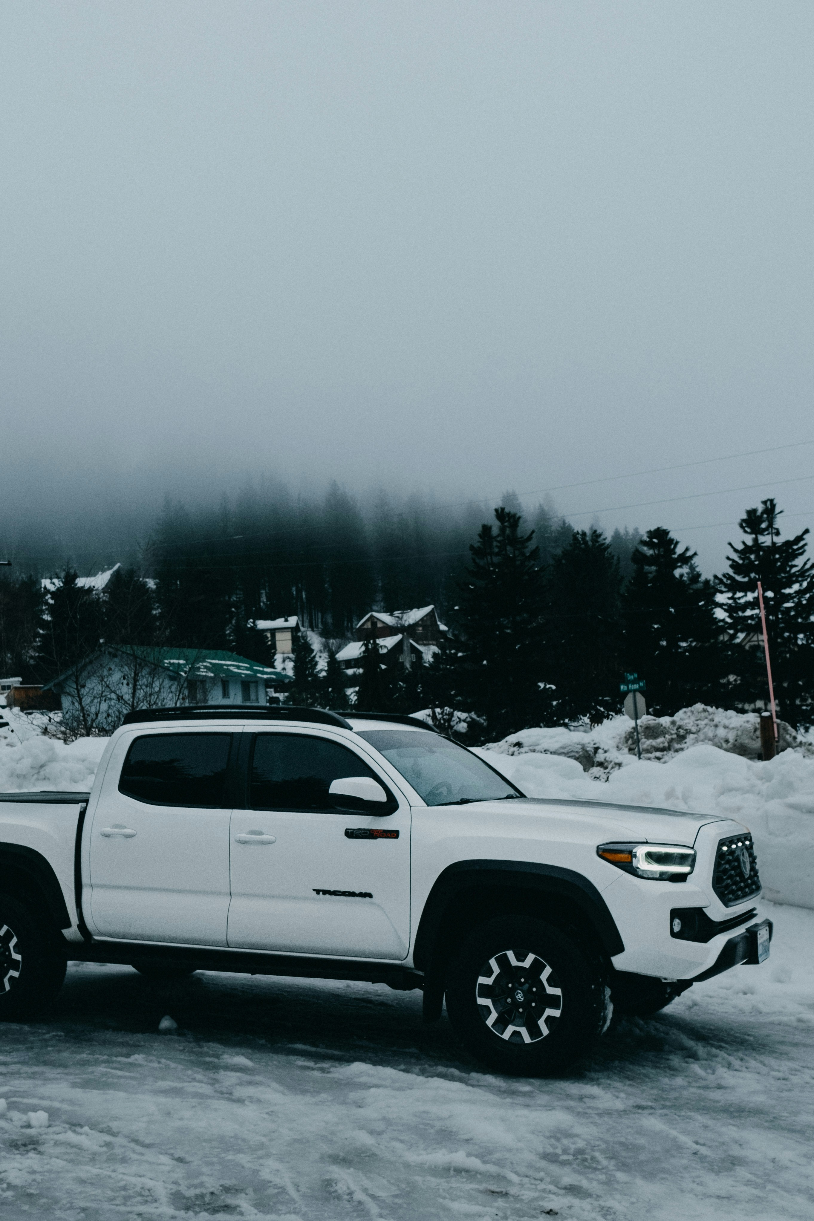 White Pickup at the Edge of Winter Fog