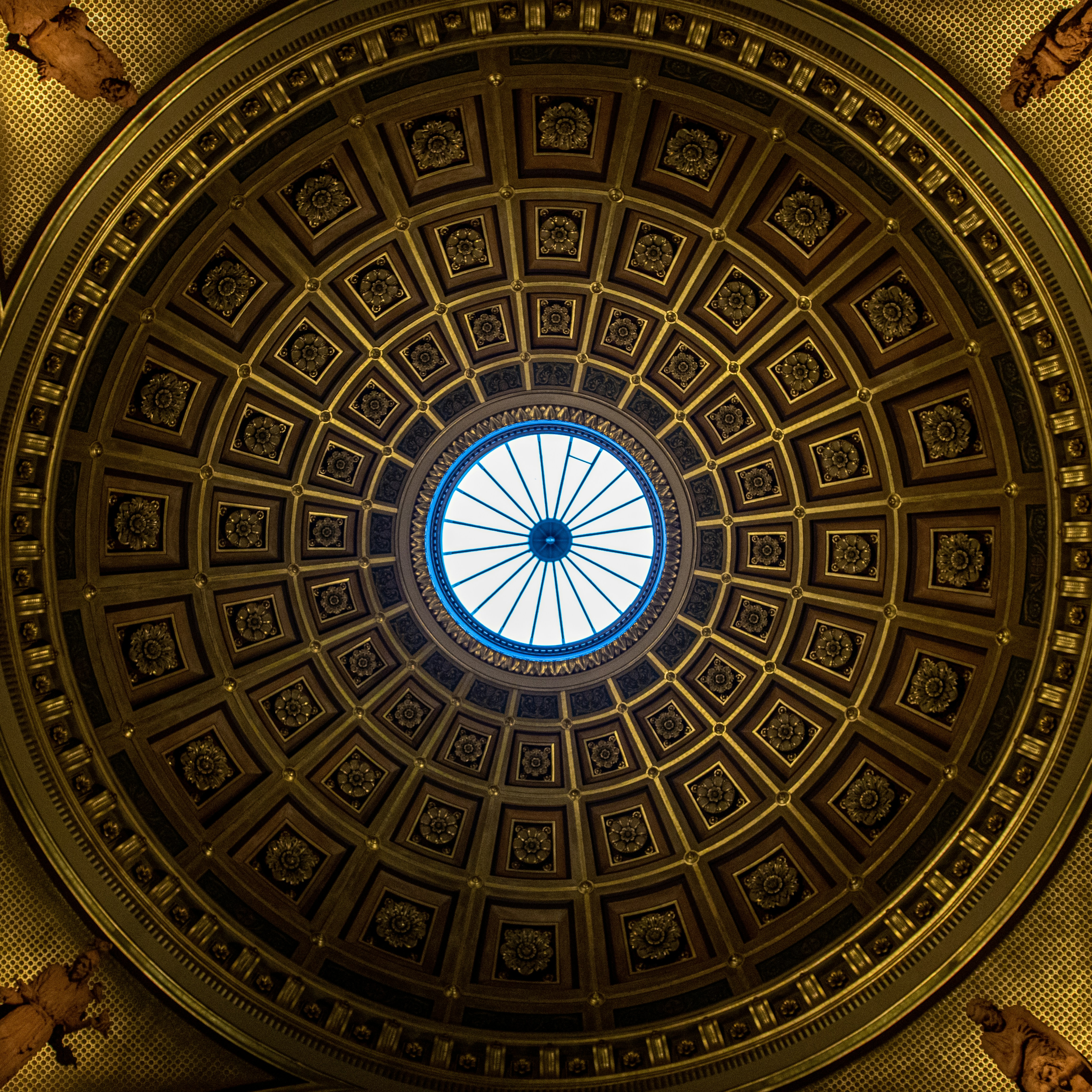 A circular ceiling with a blue skylight in the center photo – Free ...