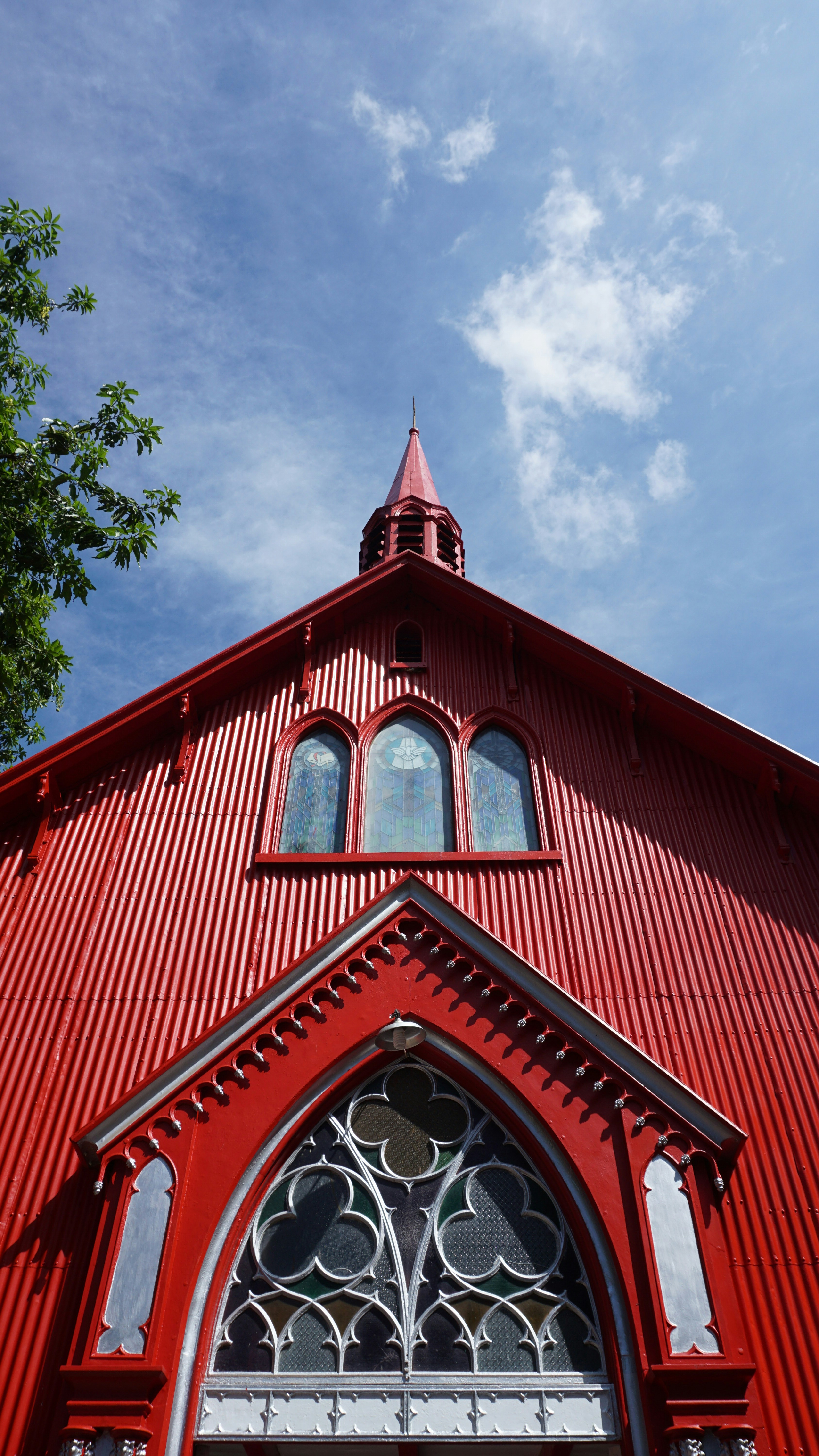 A large red church with a clock tower photo – Free Church building ...