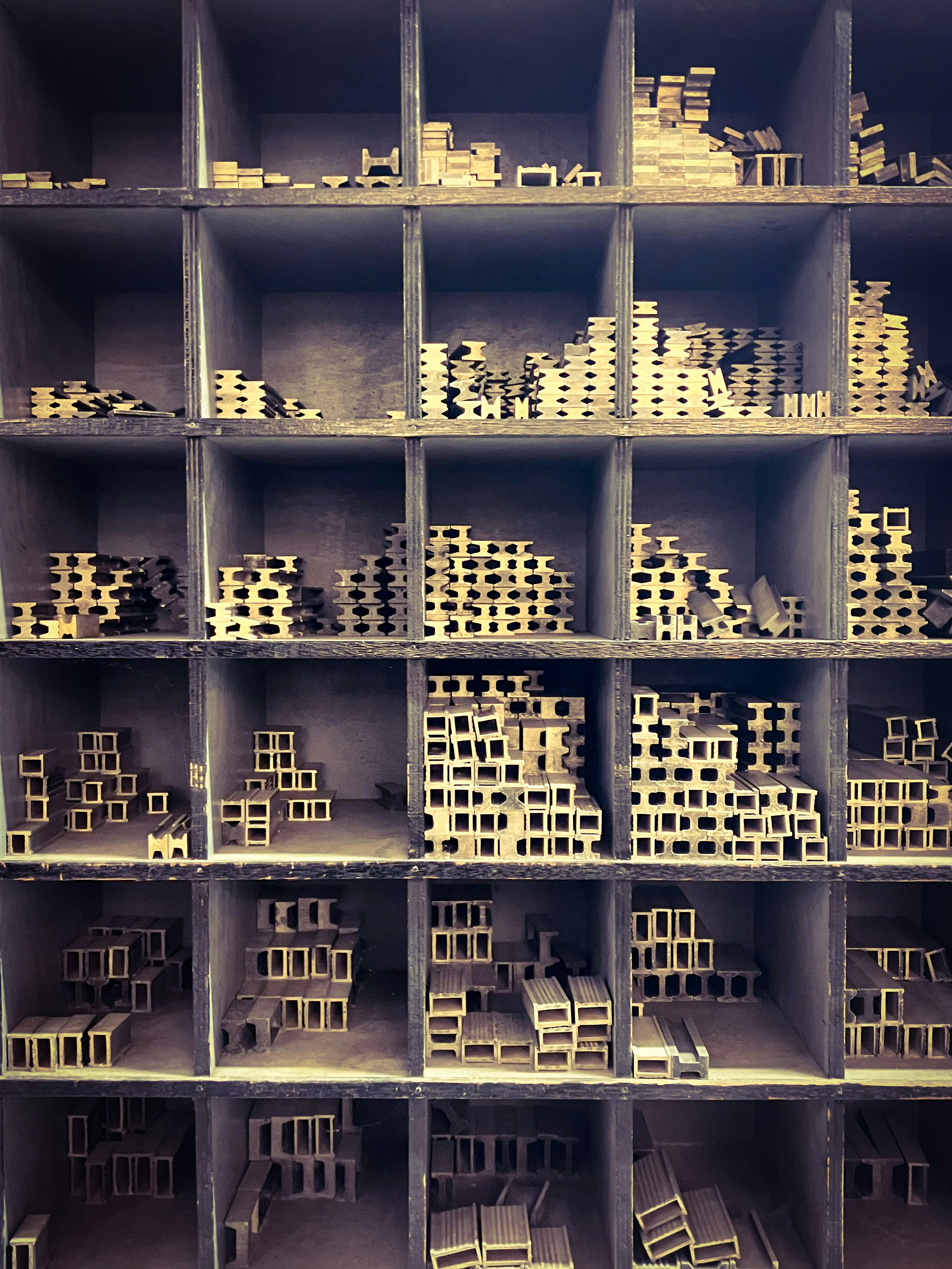 Stacks of Small Beams: Modular Timber in a Grid of Silence