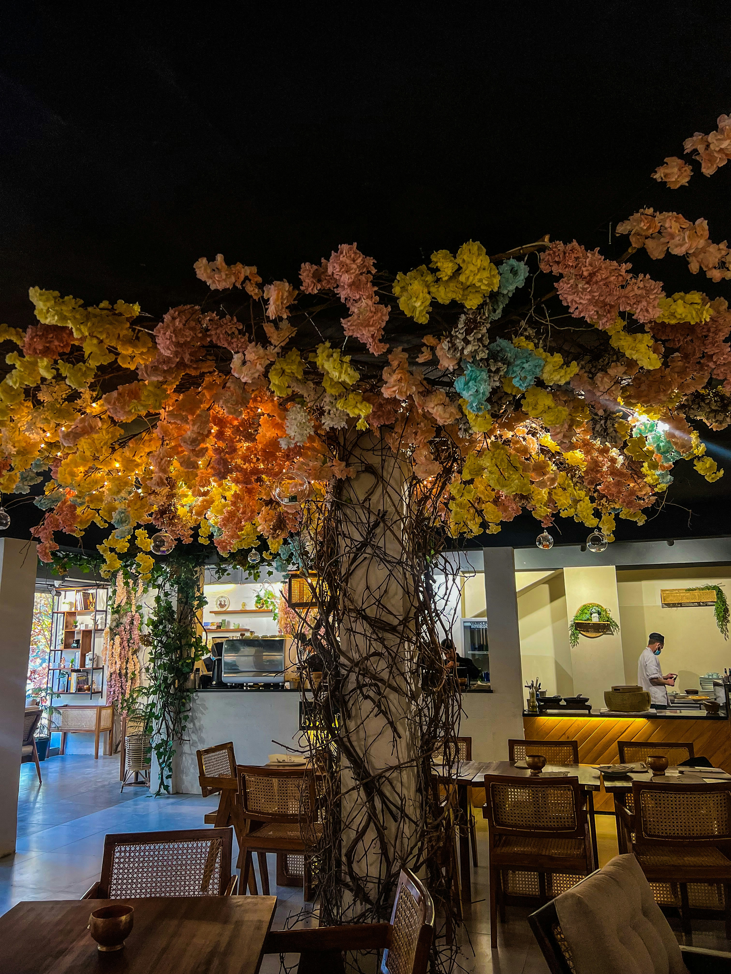 Overhead Arbor: Dining Hall Beneath a Canopy of Autumn Cranes