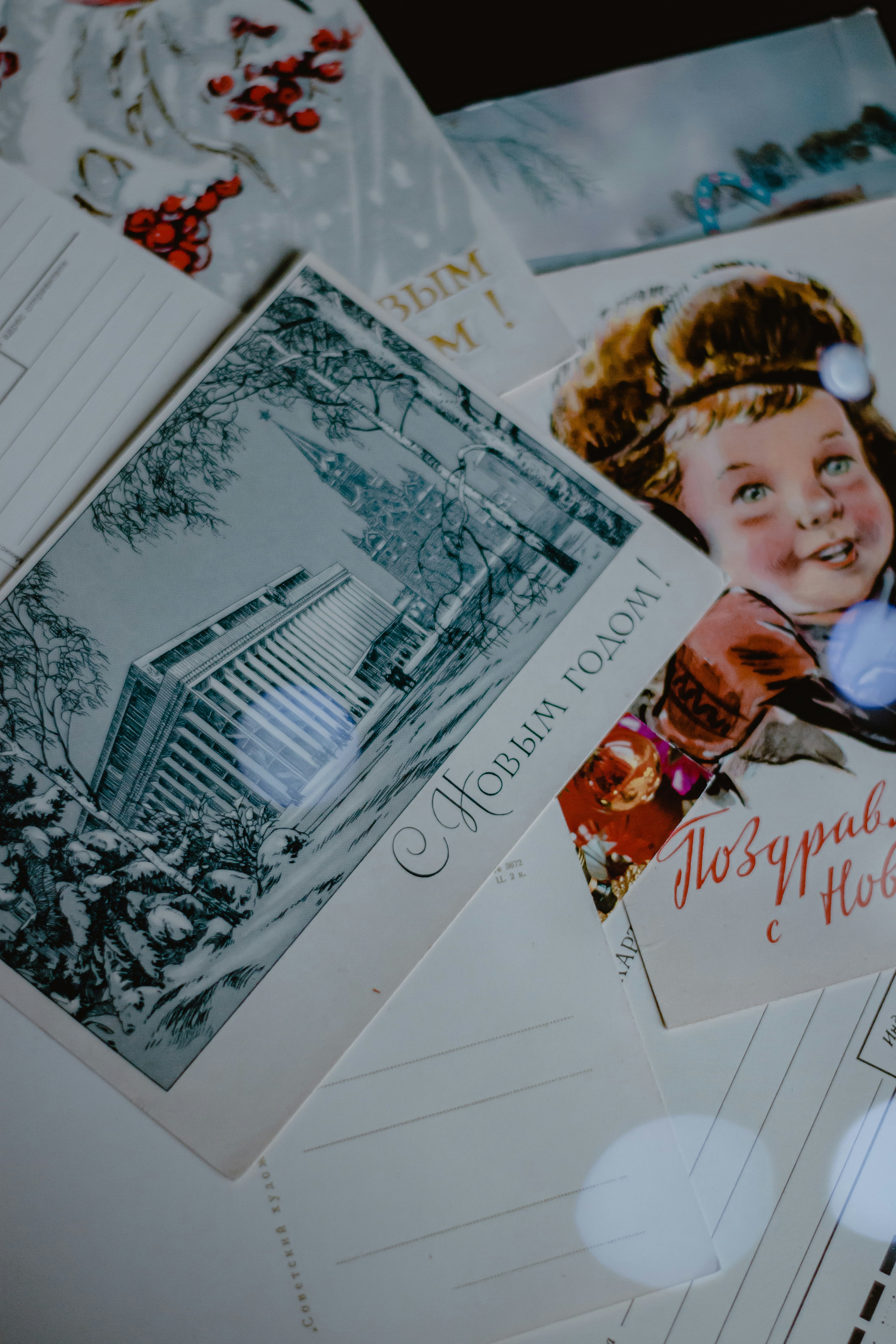 Snowy Postcard Montage with a Smiling Child