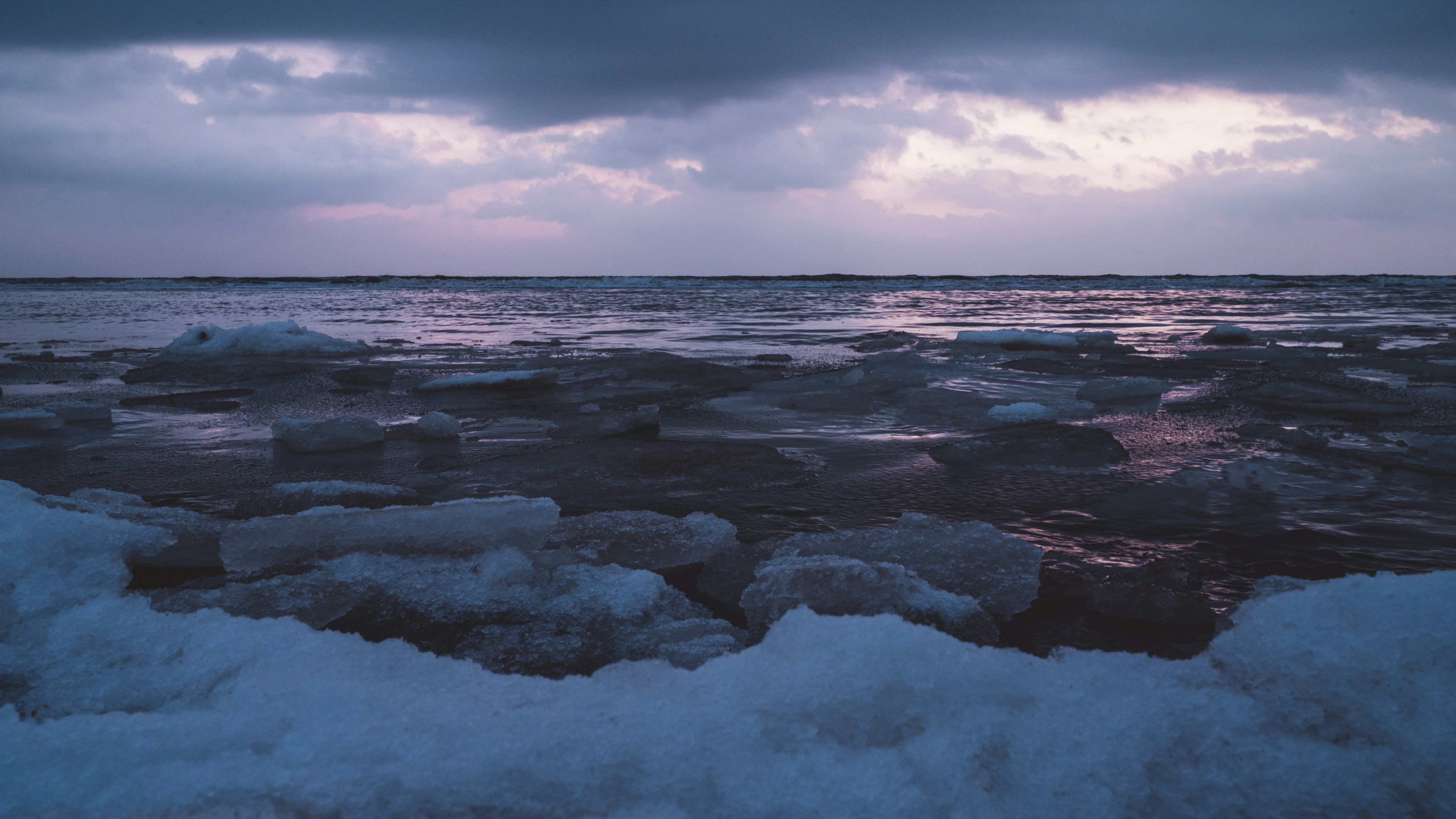 A body of water surrounded by ice and snow photo – Free Qinhuangdao ...