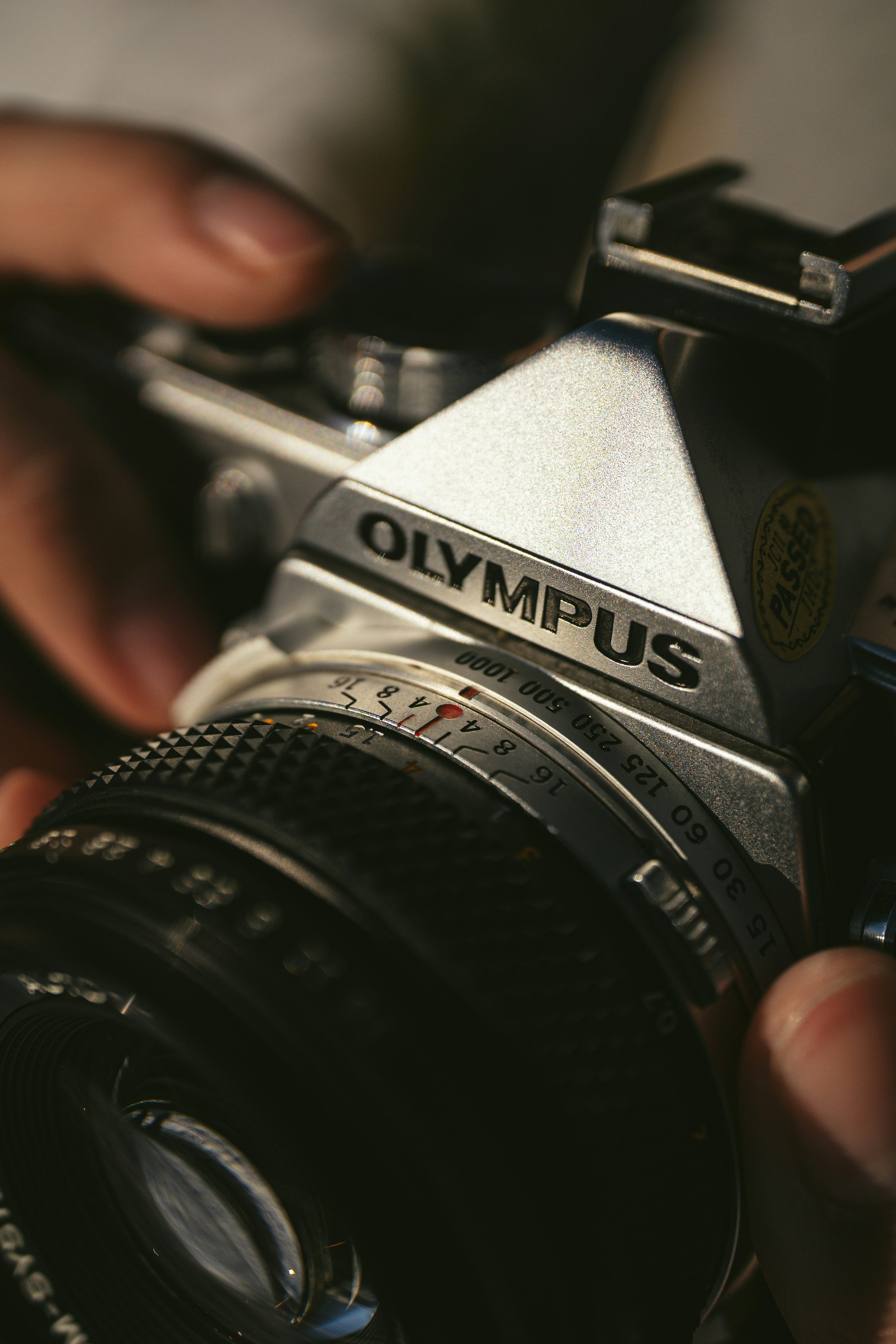 Close-Up of a Vintage Olympus SLR Grip and Lens Ramp